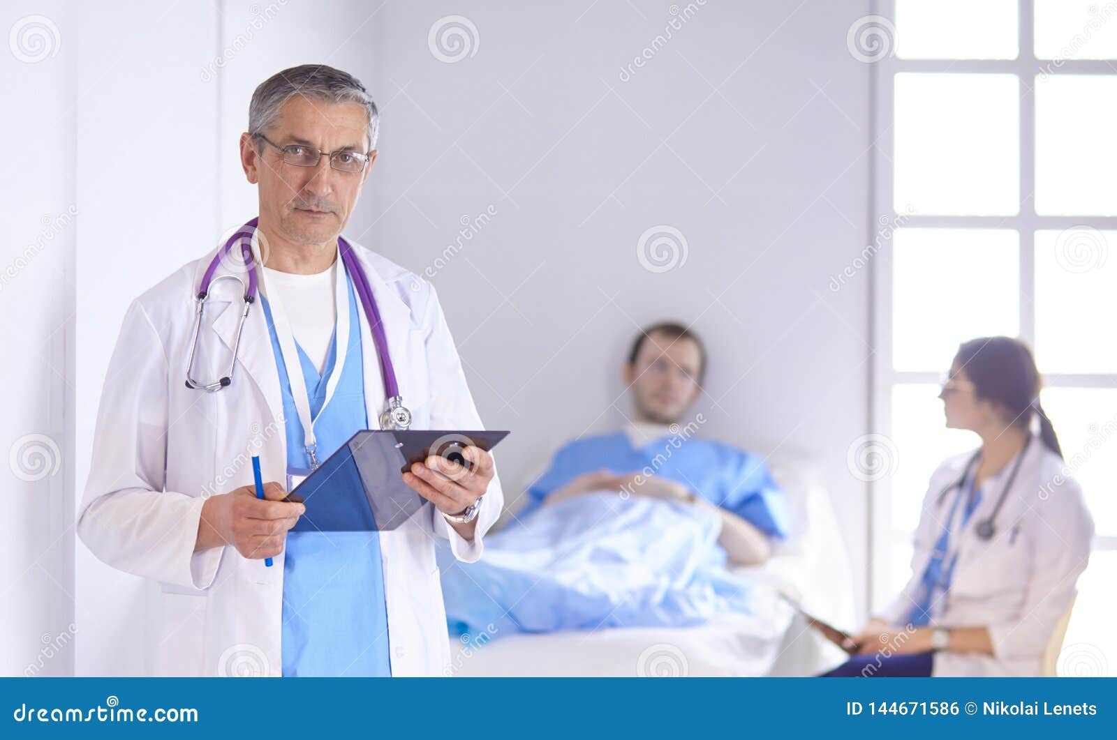 Doctor Checking Heart Beat of Patient in Bed with Stethoscope Stock ...