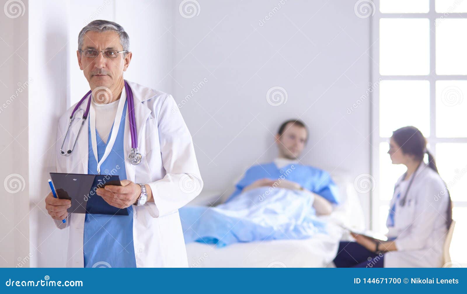 Doctor Checking Heart Beat of Patient in Bed with Stethoscope Stock ...