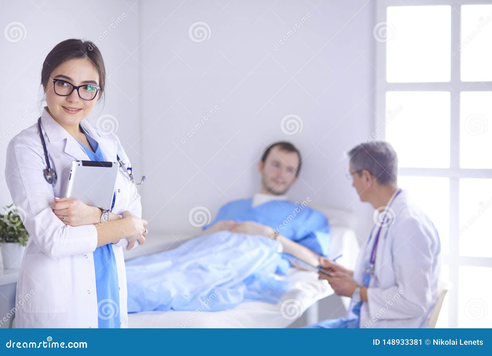 Doctor Checking Heart Beat of Patient in Bed with Stethoscope Stock ...