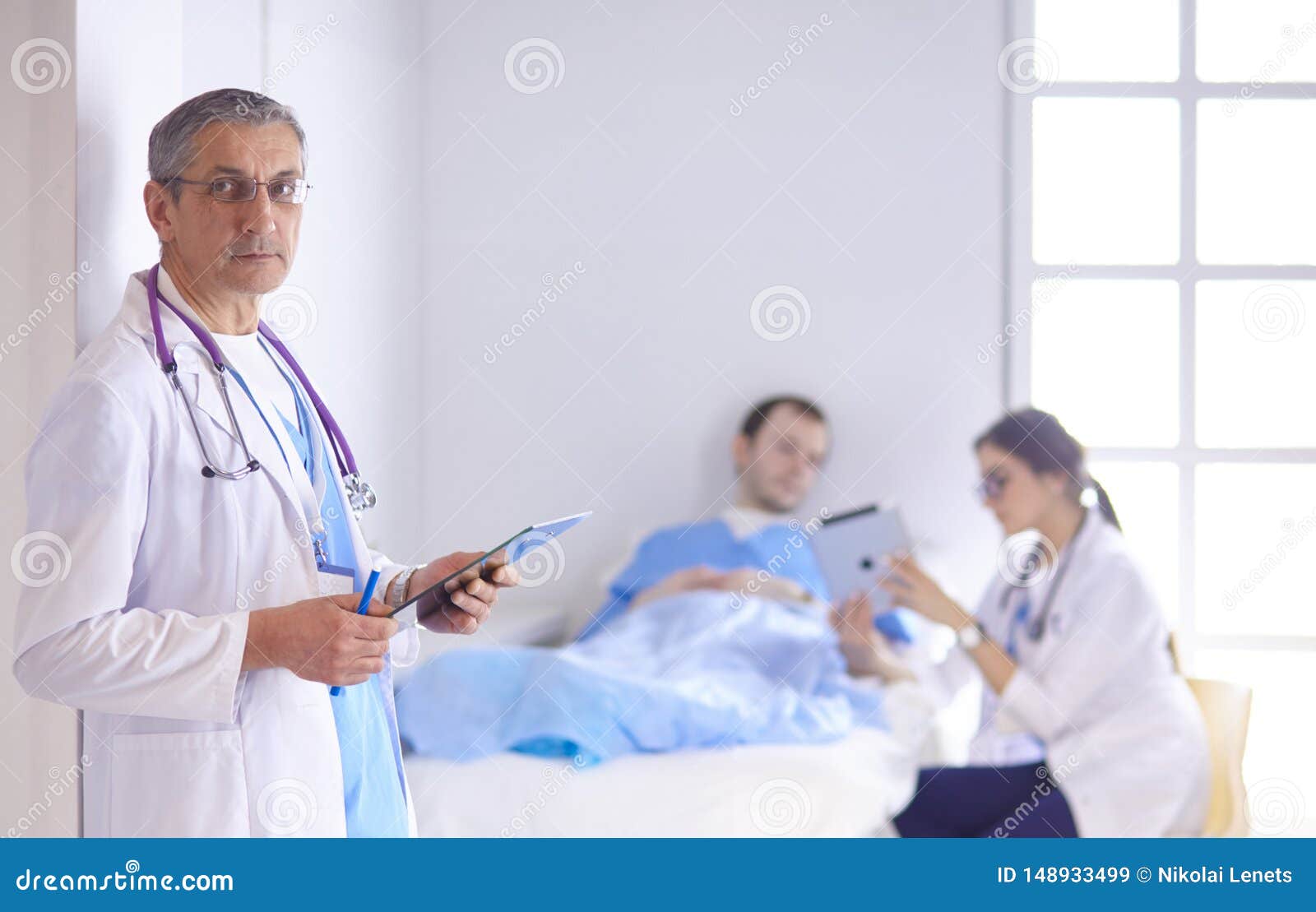 Doctor Checking Heart Beat of Patient in Bed with Stethoscope Stock ...