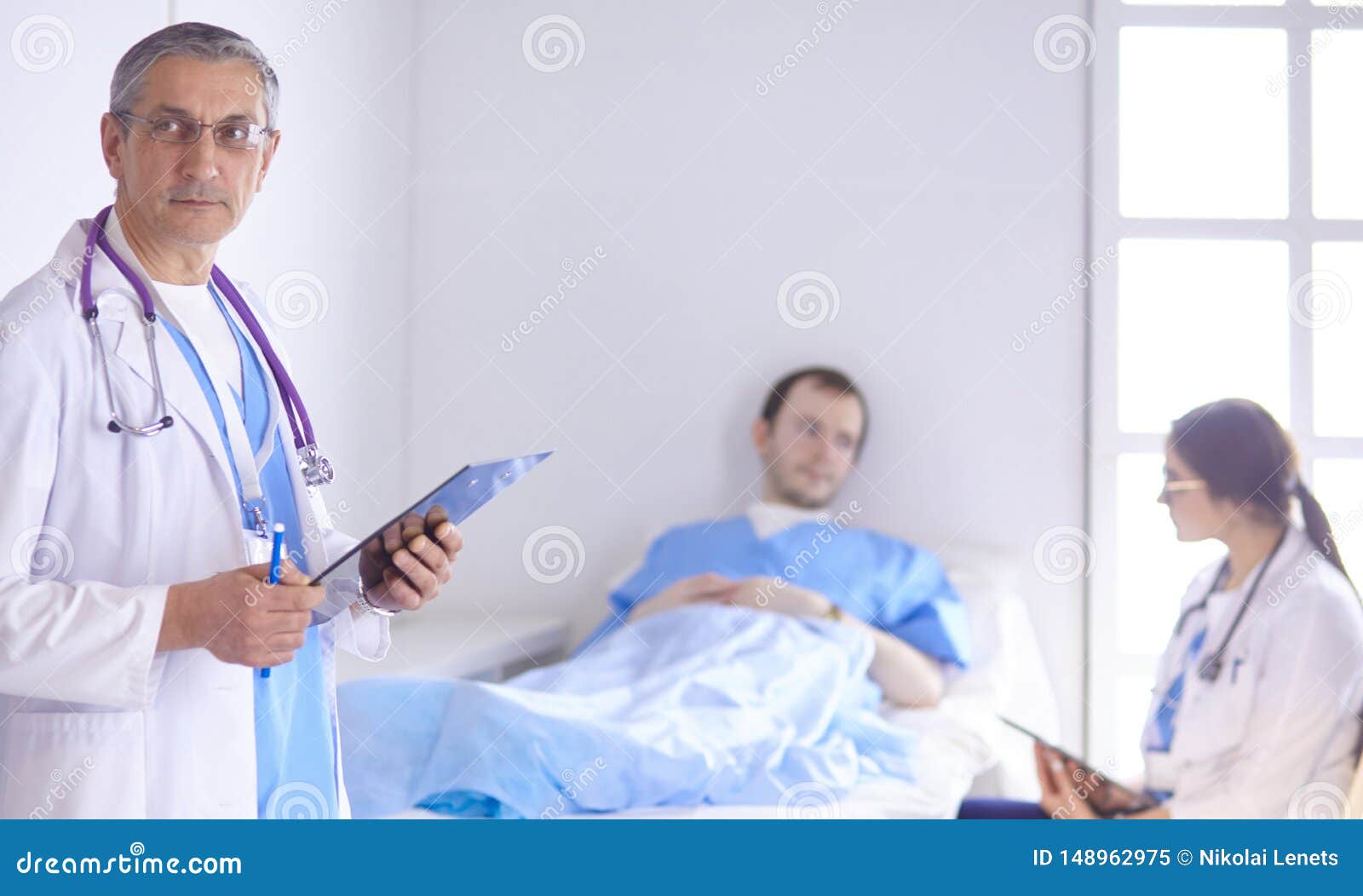 Doctor Checking Heart Beat of Patient in Bed with Stethoscope Stock ...