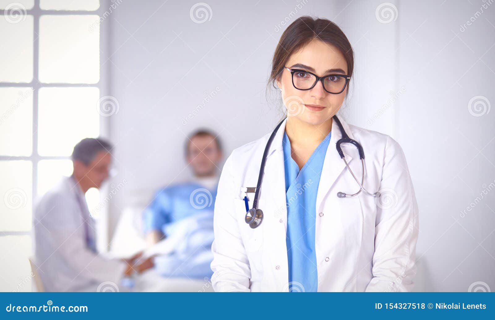 Doctor Checking Heart Beat of Patient in Bed with Stethoscope Stock ...