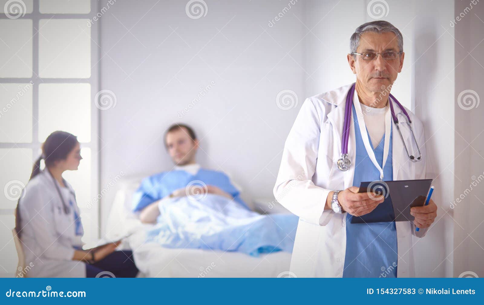Doctor Checking Heart Beat of Patient in Bed with Stethoscope Stock ...