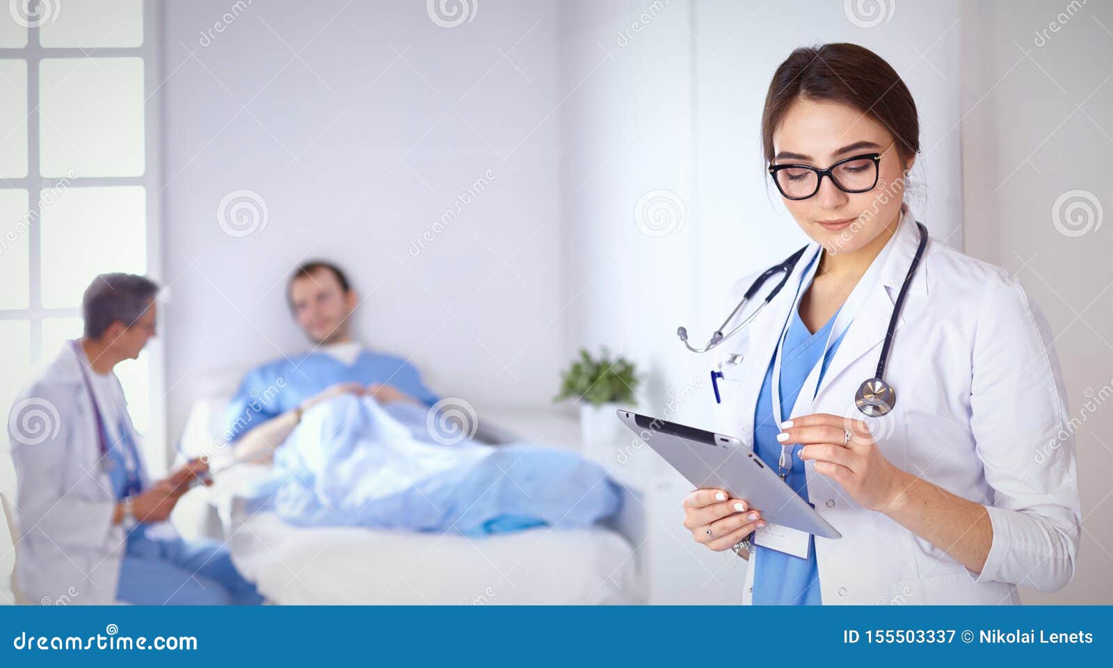 Doctor Checking Heart Beat of Patient in Bed with Stethoscope Stock ...