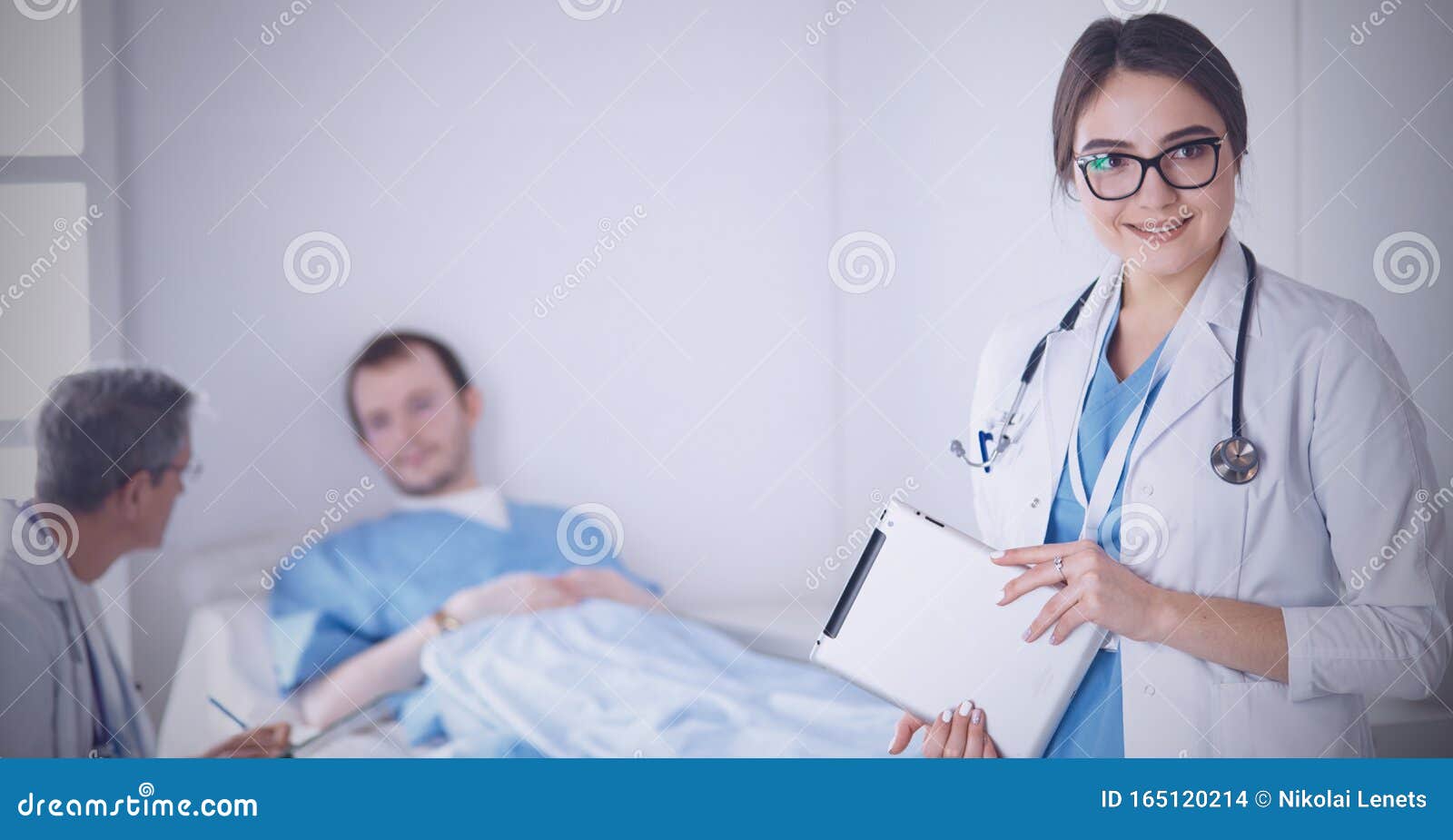 Doctor Checking Heart Beat of Patient in Bed with Stethoscope Stock ...
