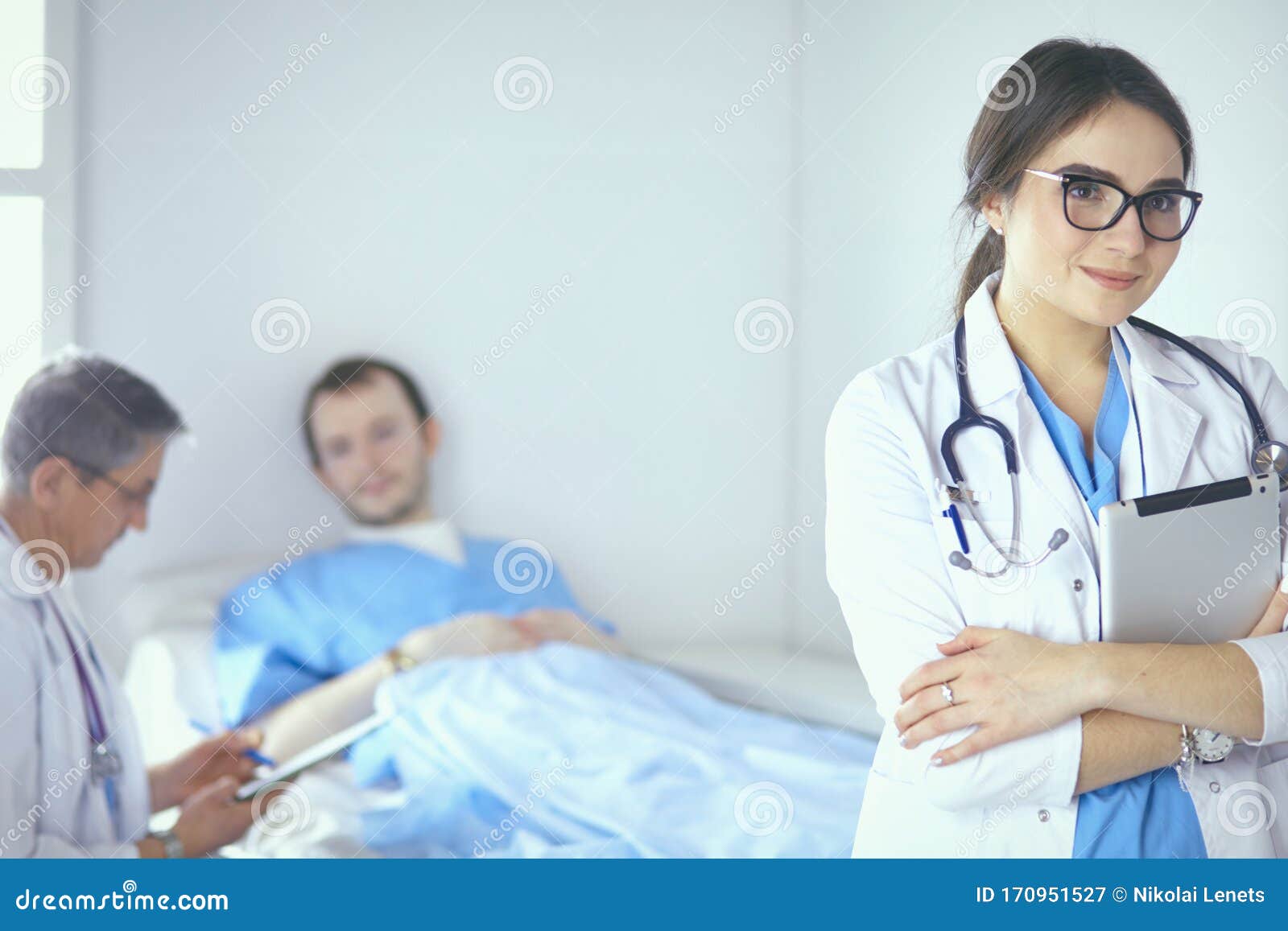 Doctor Checking Heart Beat of Patient in Bed with Stethoscope Stock ...