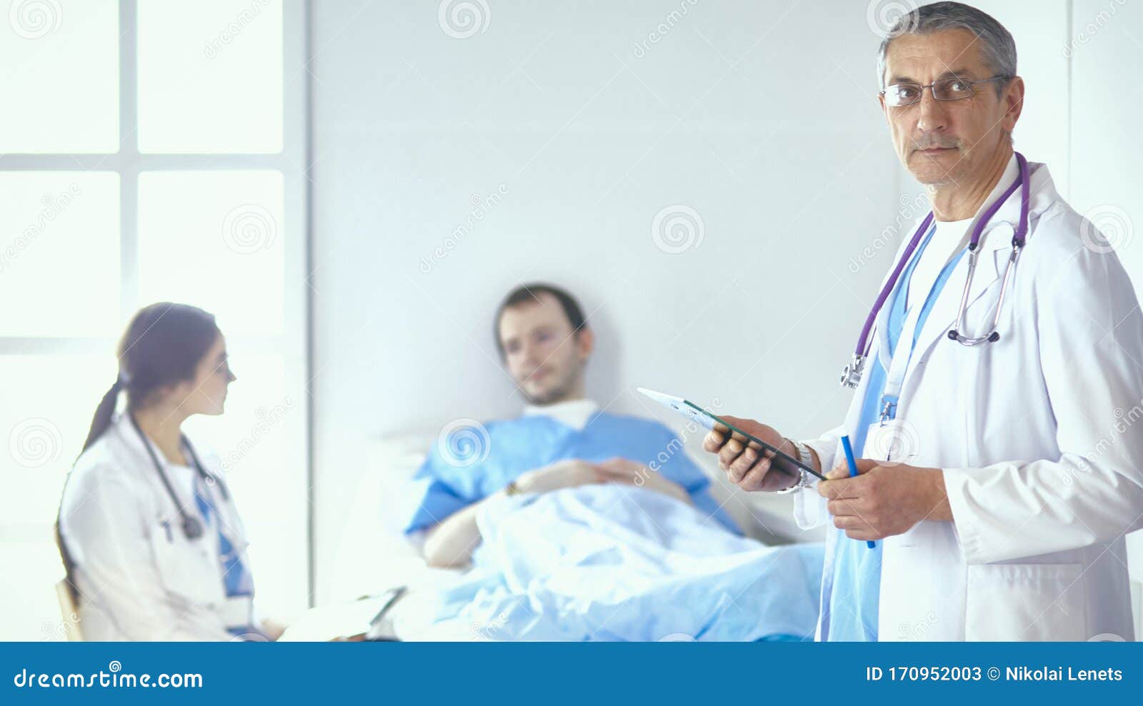 Doctor Checking Heart Beat of Patient in Bed with Stethoscope Stock ...