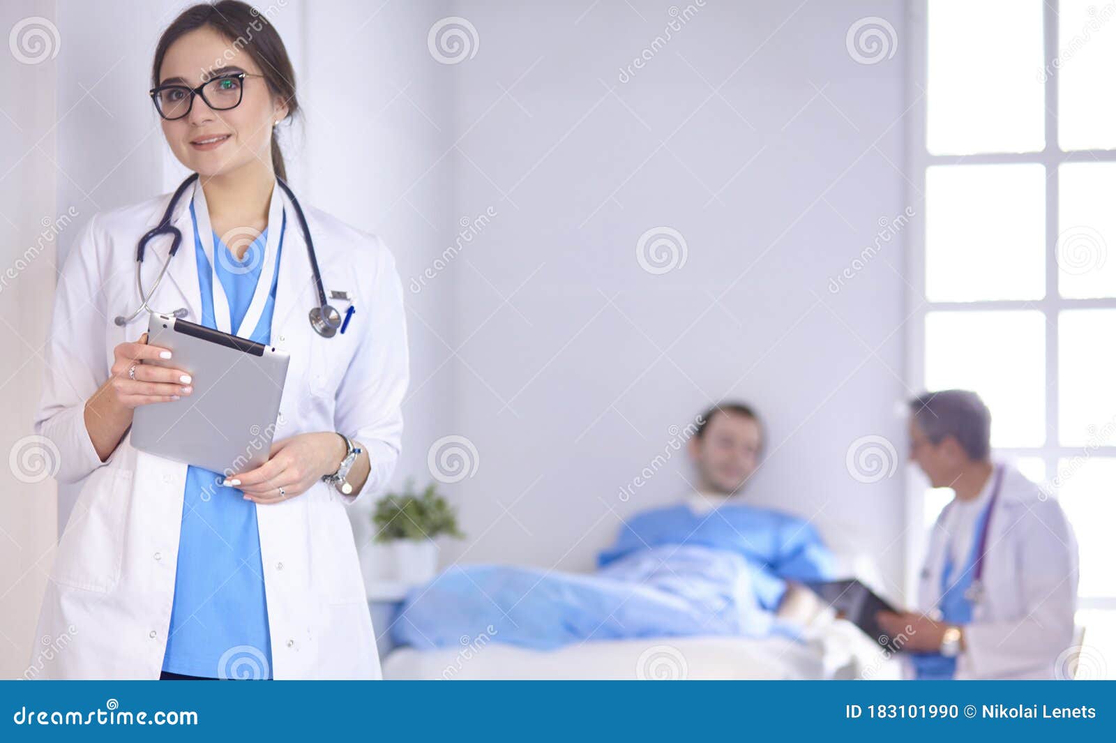 Doctor Checking Heart Beat of Patient in Bed with Stethoscope Stock ...