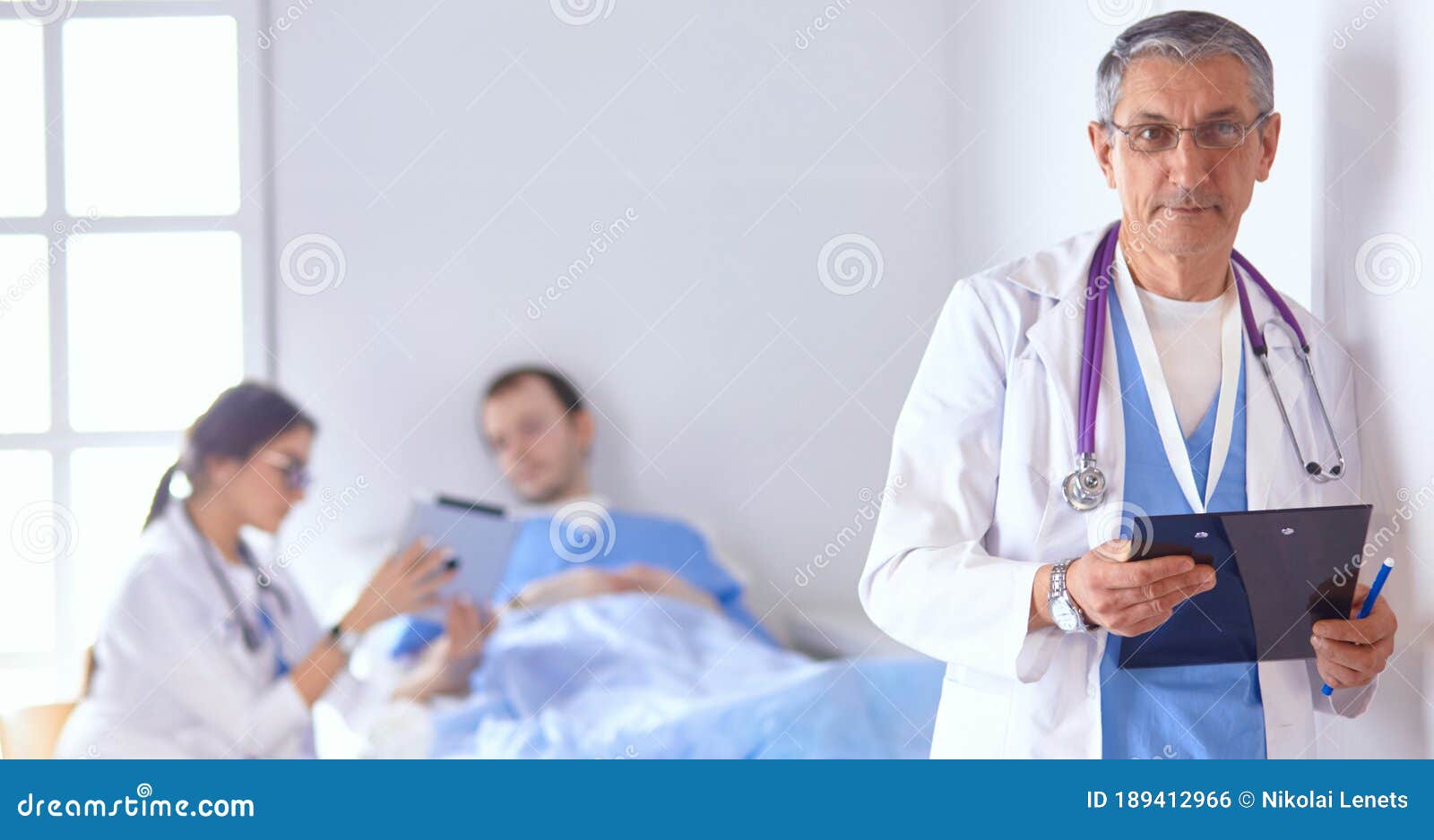 Doctor Checking Heart Beat of Patient in Bed with Stethoscope Stock ...