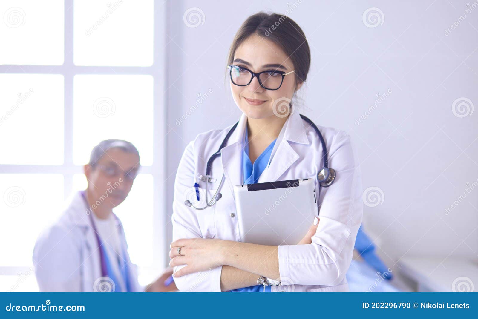 Doctor Checking Heart Beat of Patient in Bed with Stethoscope Stock ...