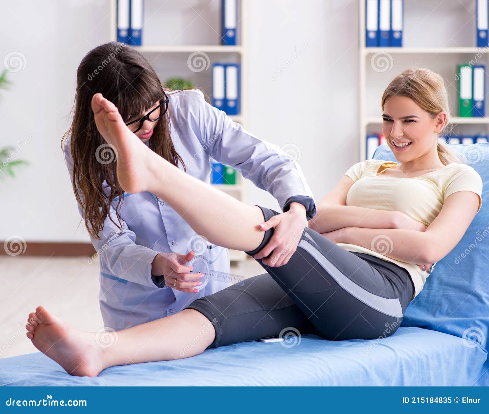 Doctor Checking Joint Flexibility with Goniometer Stock Image - Image ...