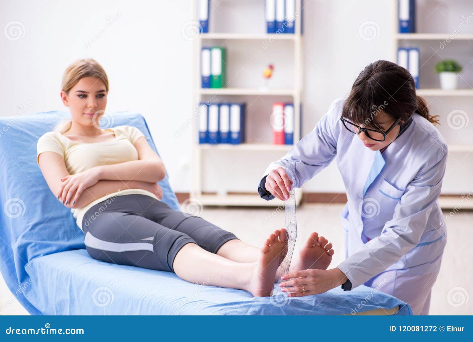 The Doctor Checking Joint Flexibility with Goniometer Stock Photo ...
