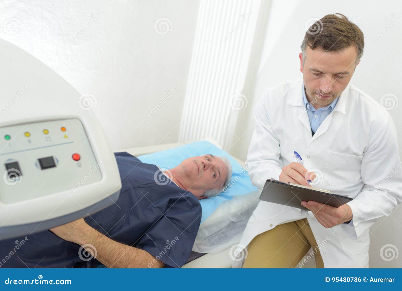Doctor Checking Medical Record Patient during Scan Stock Photo - Image ...