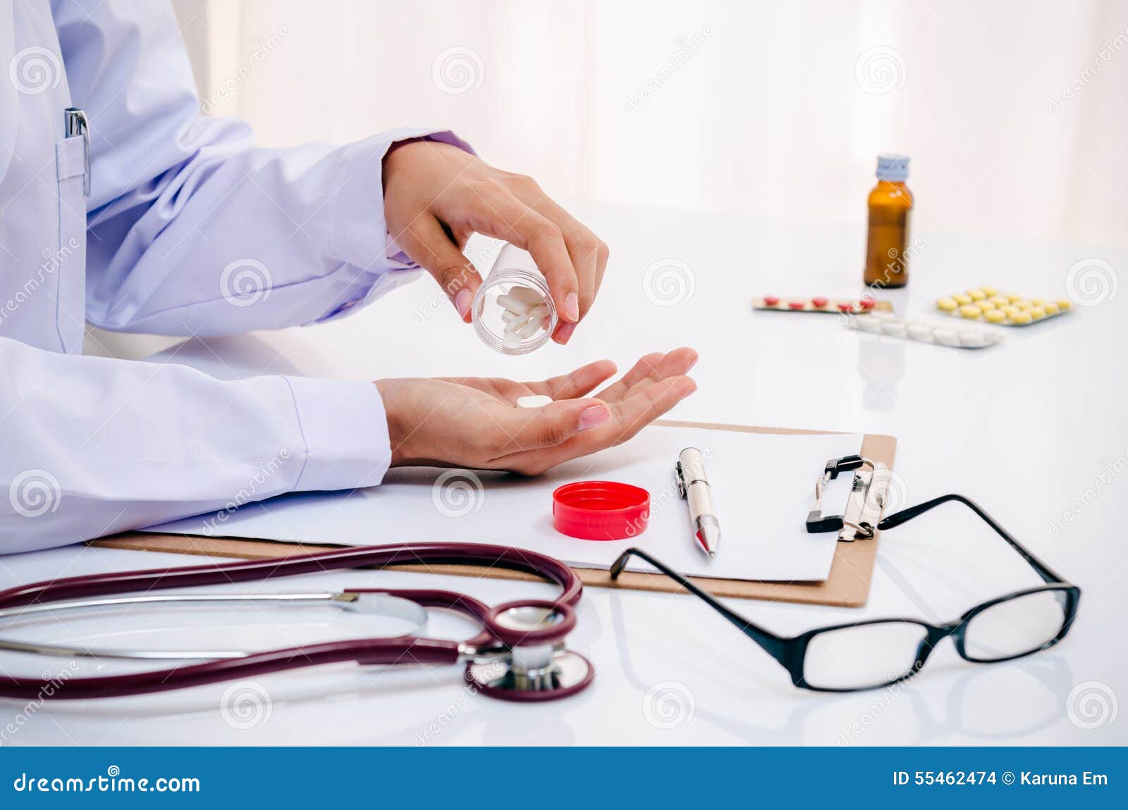 Doctor checking medicine stock photo. Image of department - 55462474