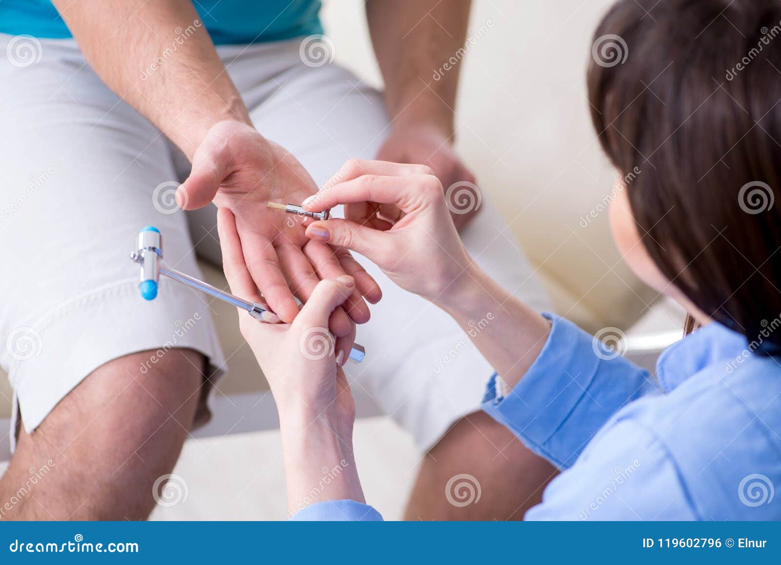 The Doctor Checking Nerve Reflexes with Hammer Stock Photo - Image of ...