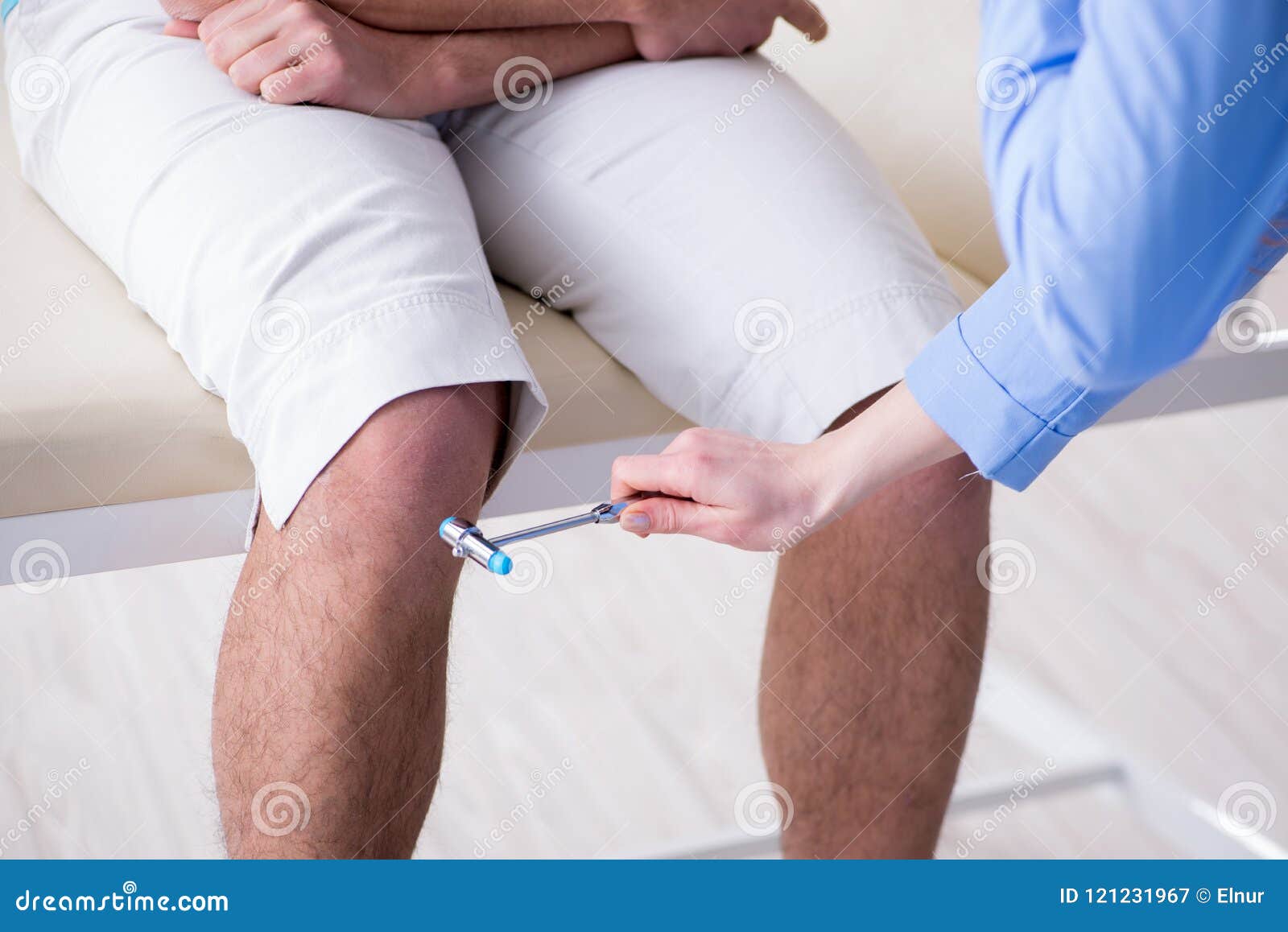 The Doctor Checking Nerve Reflexes with Hammer Stock Image - Image of ...