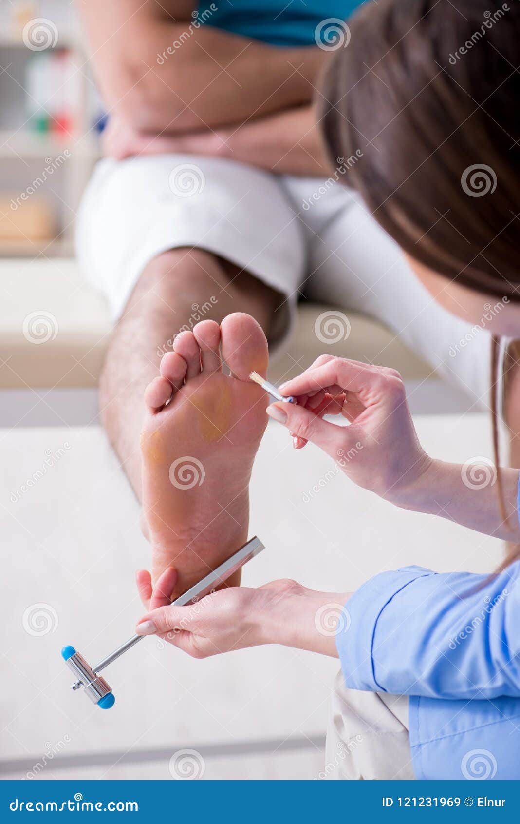 The Doctor Checking Nerve Reflexes with Hammer Stock Image - Image of ...
