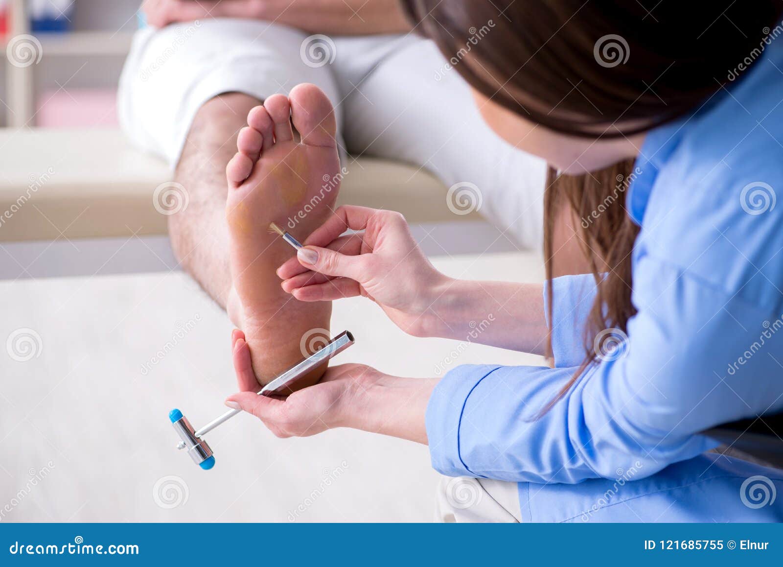 The Doctor Checking Nerve Reflexes with Hammer Stock Image - Image of ...