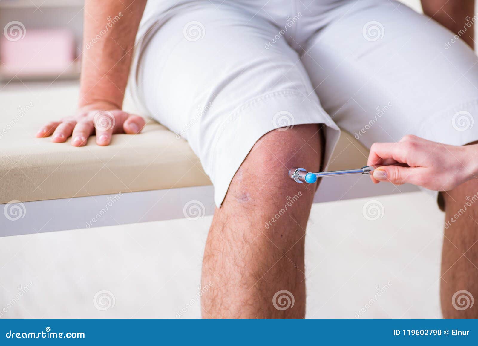 The Doctor Checking Nerve Reflexes with Hammer Stock Photo - Image of ...