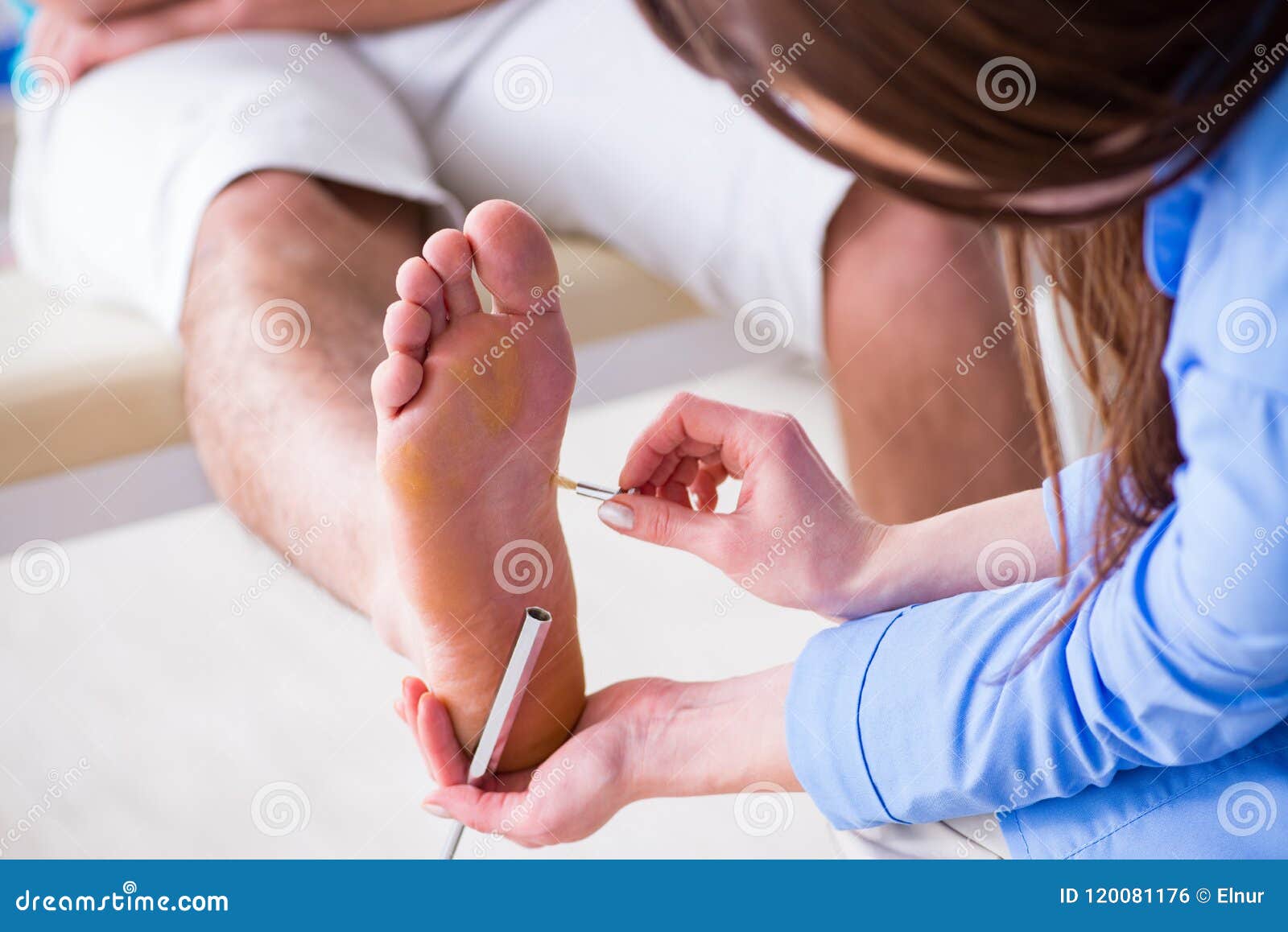 The Doctor Checking Nerve Reflexes with Hammer Stock Photo - Image of ...