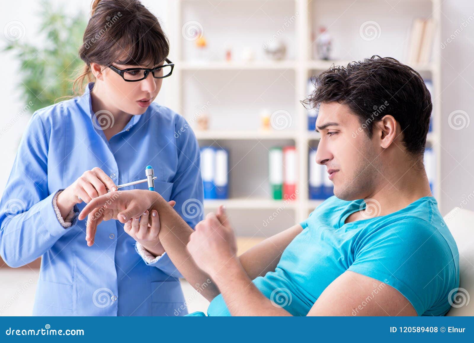 The Doctor Checking Nerve Reflexes with Hammer Stock Photo - Image of ...