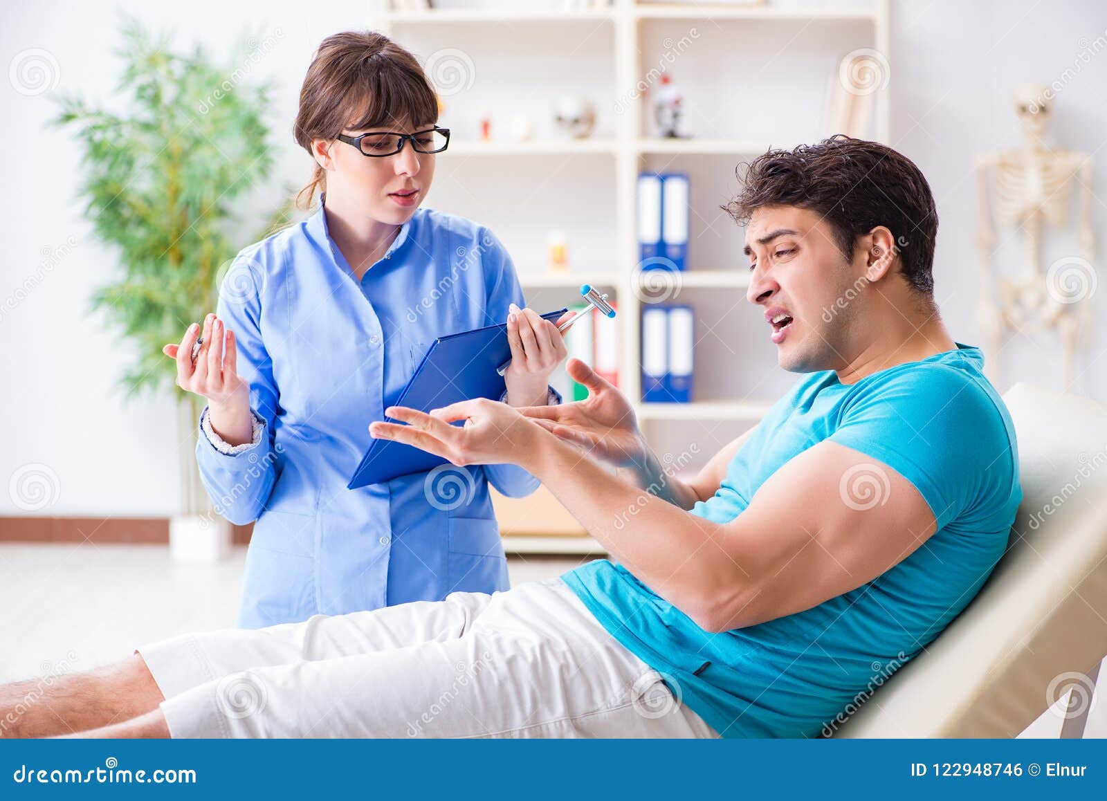 The Doctor Checking Nerve Reflexes with Hammer Stock Photo - Image of ...