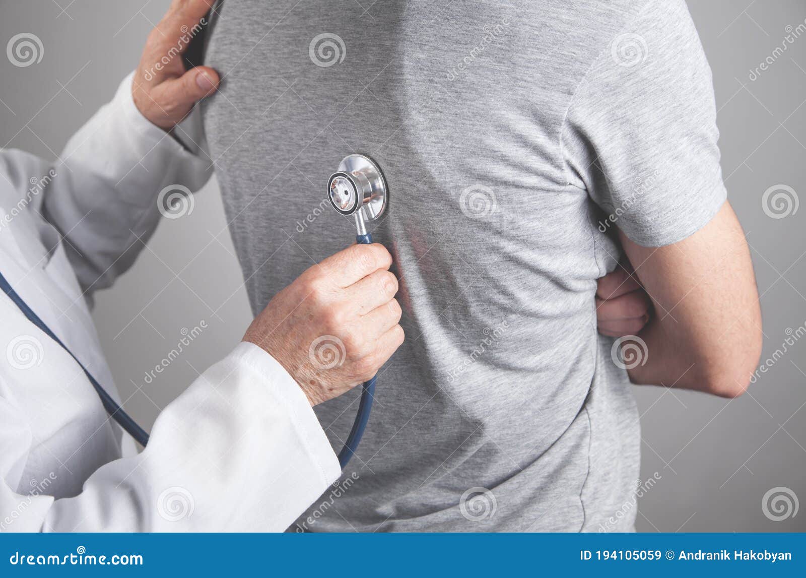 Doctor Checking Patient Back with Stethoscope at Hospital Stock Image ...