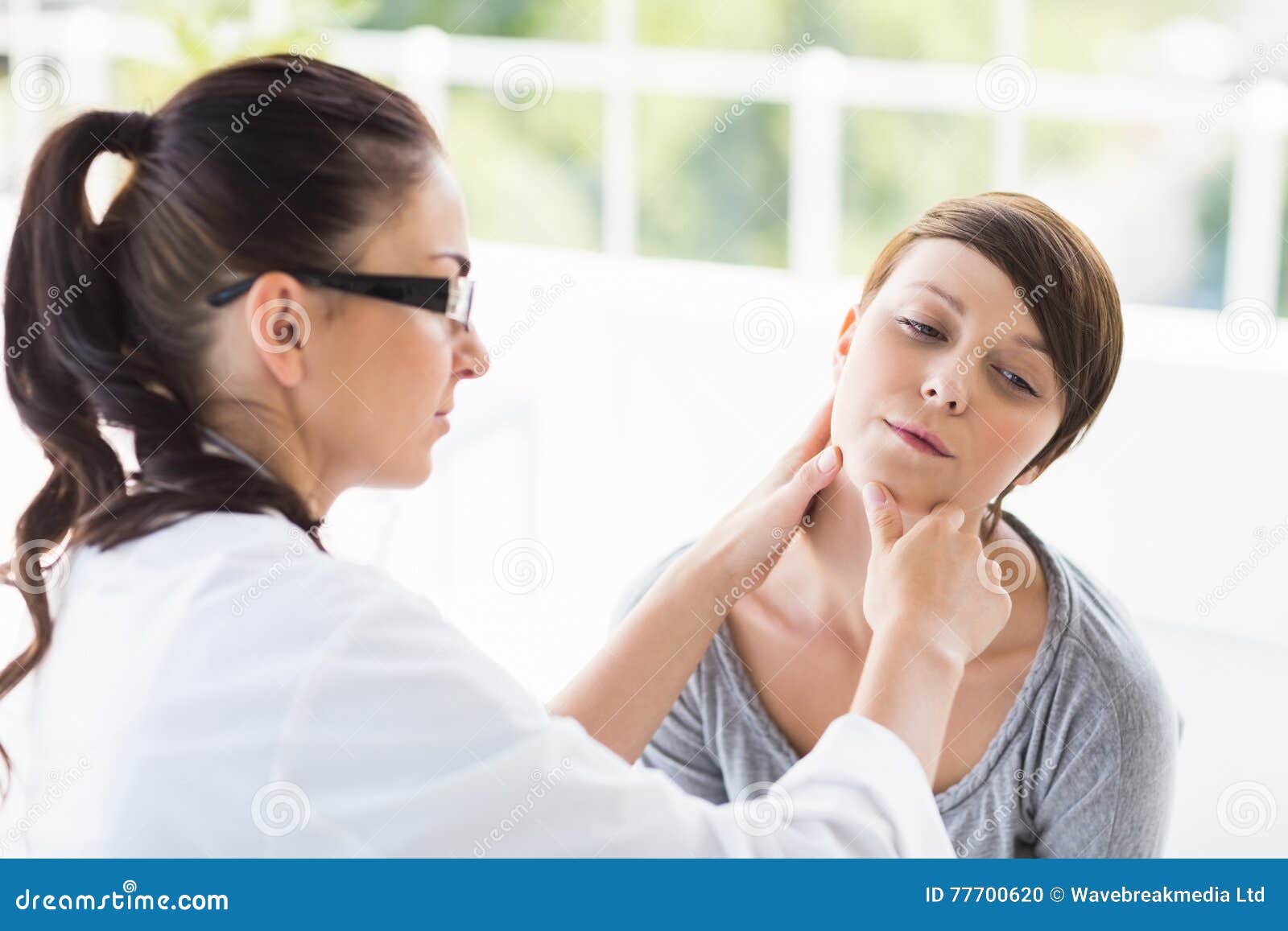 Doctor checking patient stock photo. Image of medical - 77700620