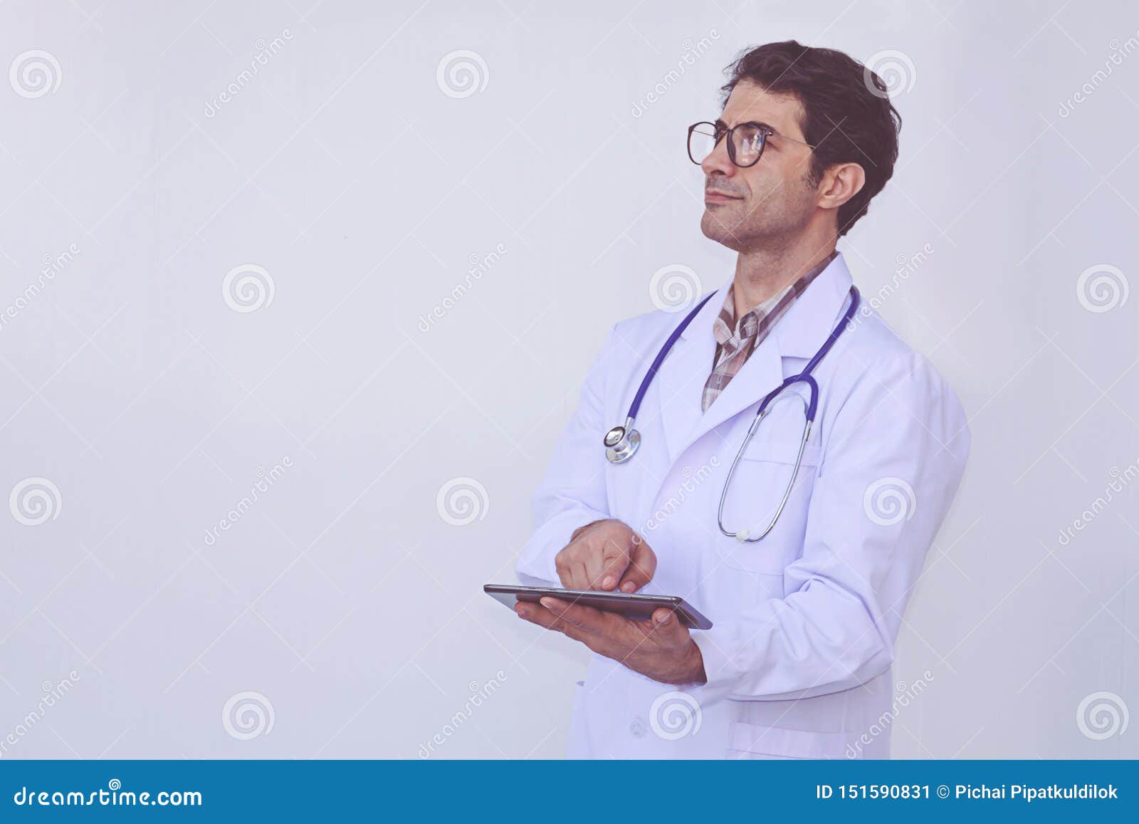 Doctor Checking Patient Information on a Tablet Device Stock Image ...