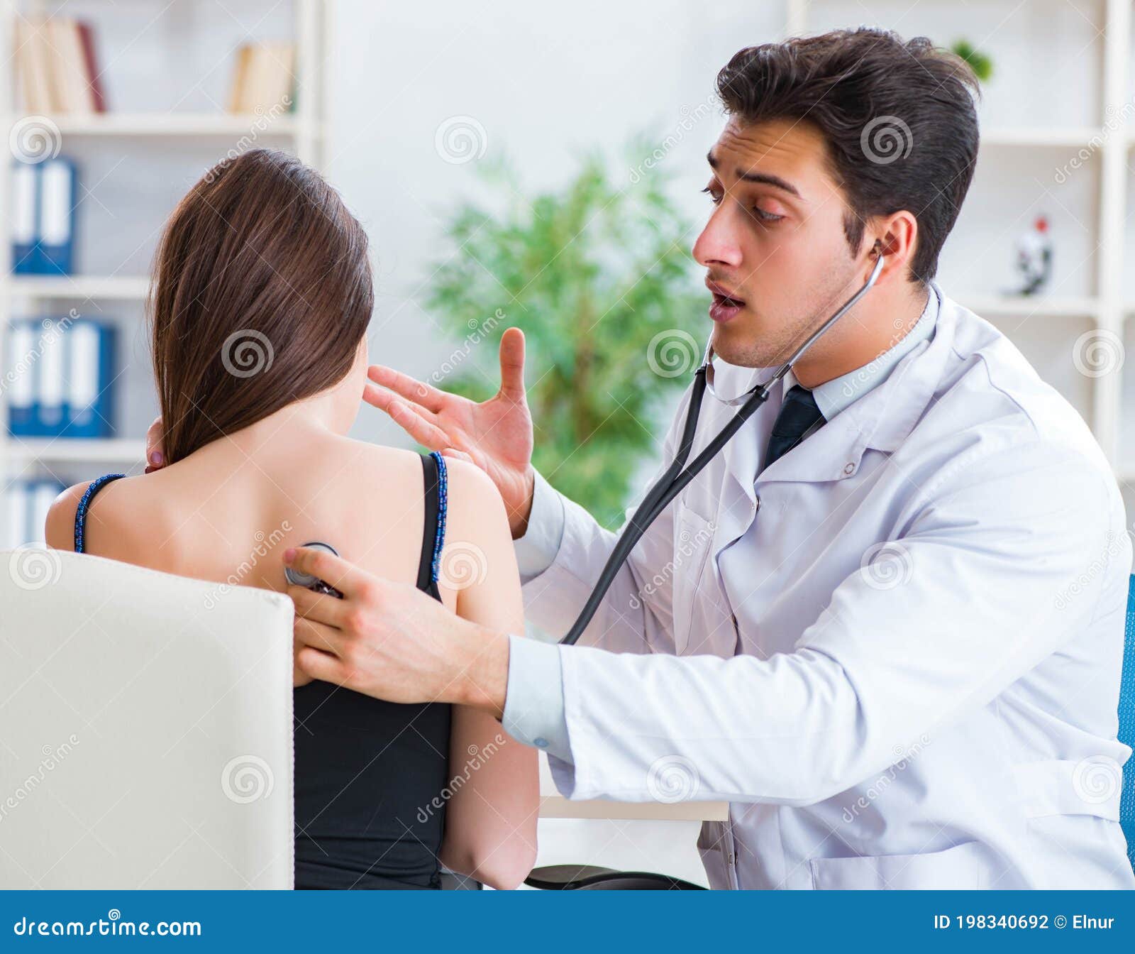 Doctor Checking Patient with Stethoscope Stock Photo - Image of ...