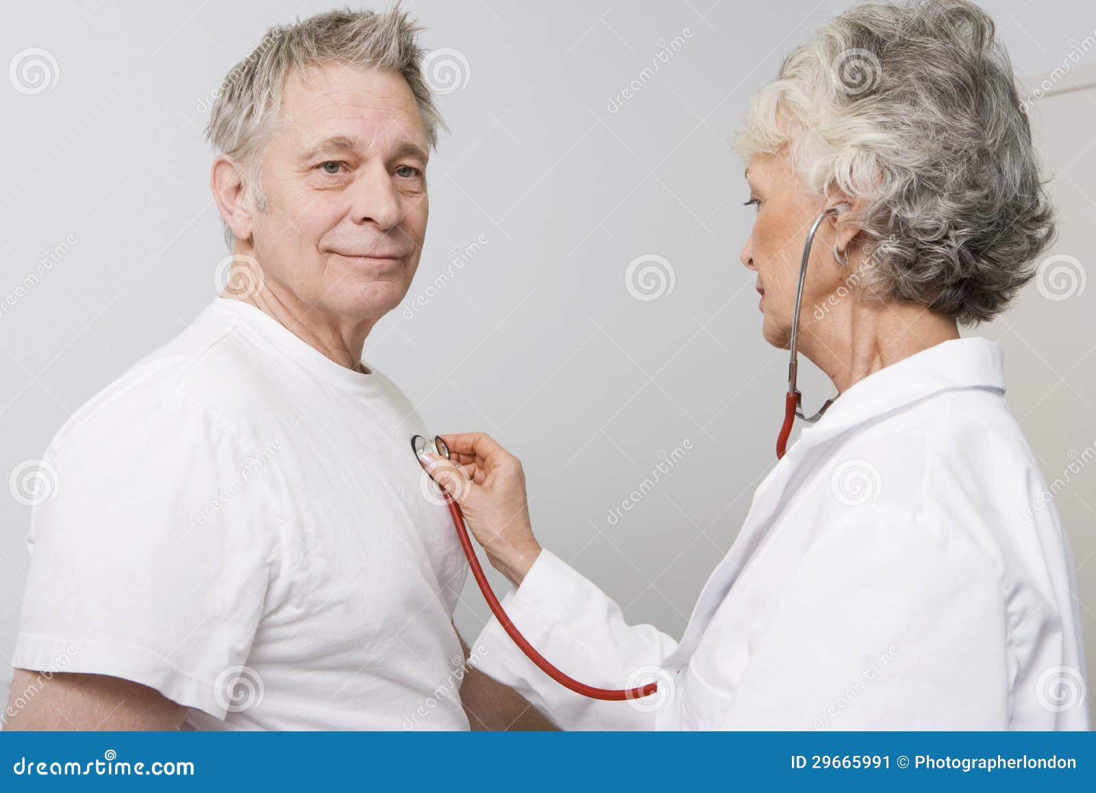 Doctor Checking Patient Using Stethoscope Stock Image - Image of ...