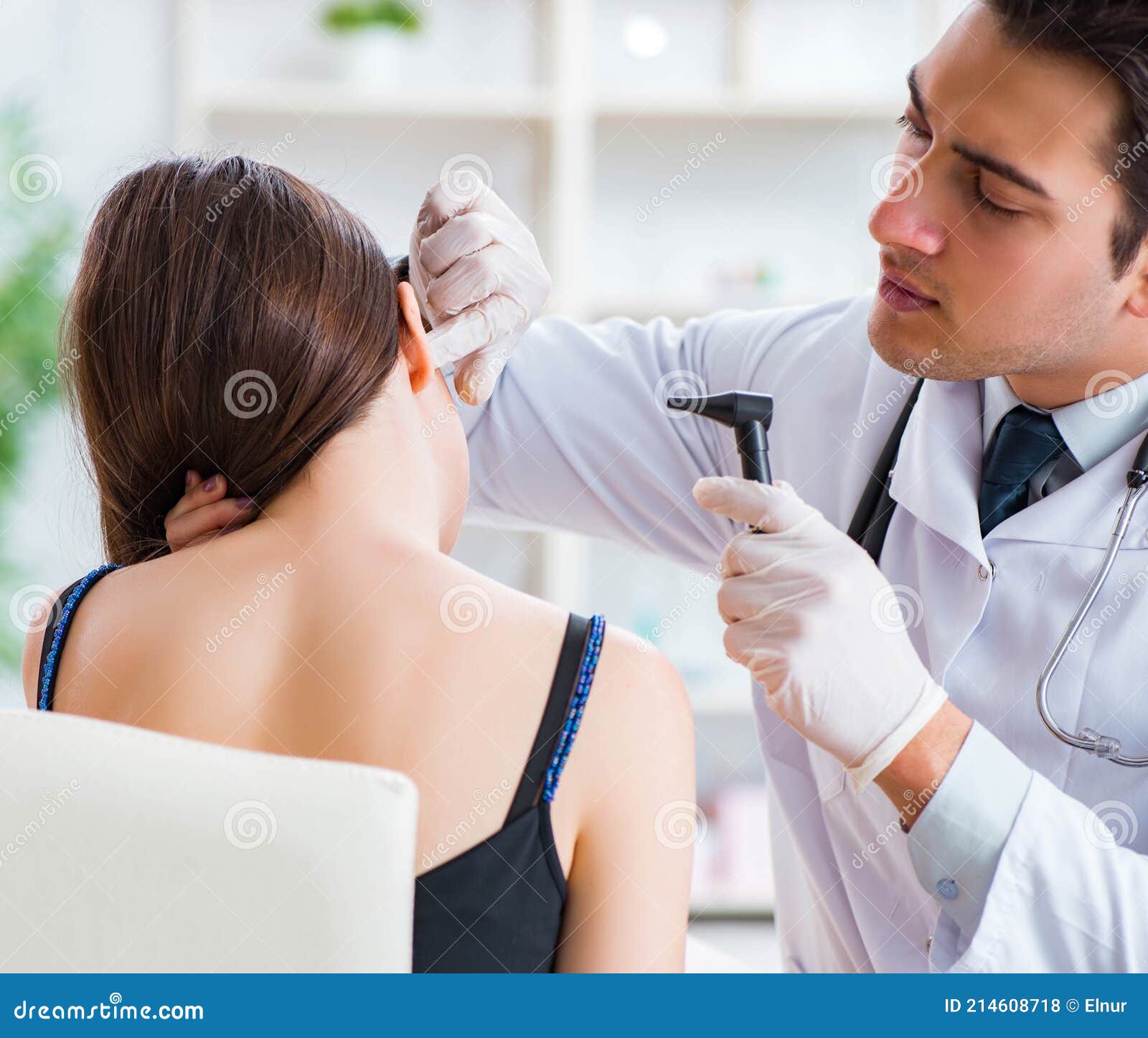 Doctor Checking Patients Ear during Medical Examination Stock Photo ...
