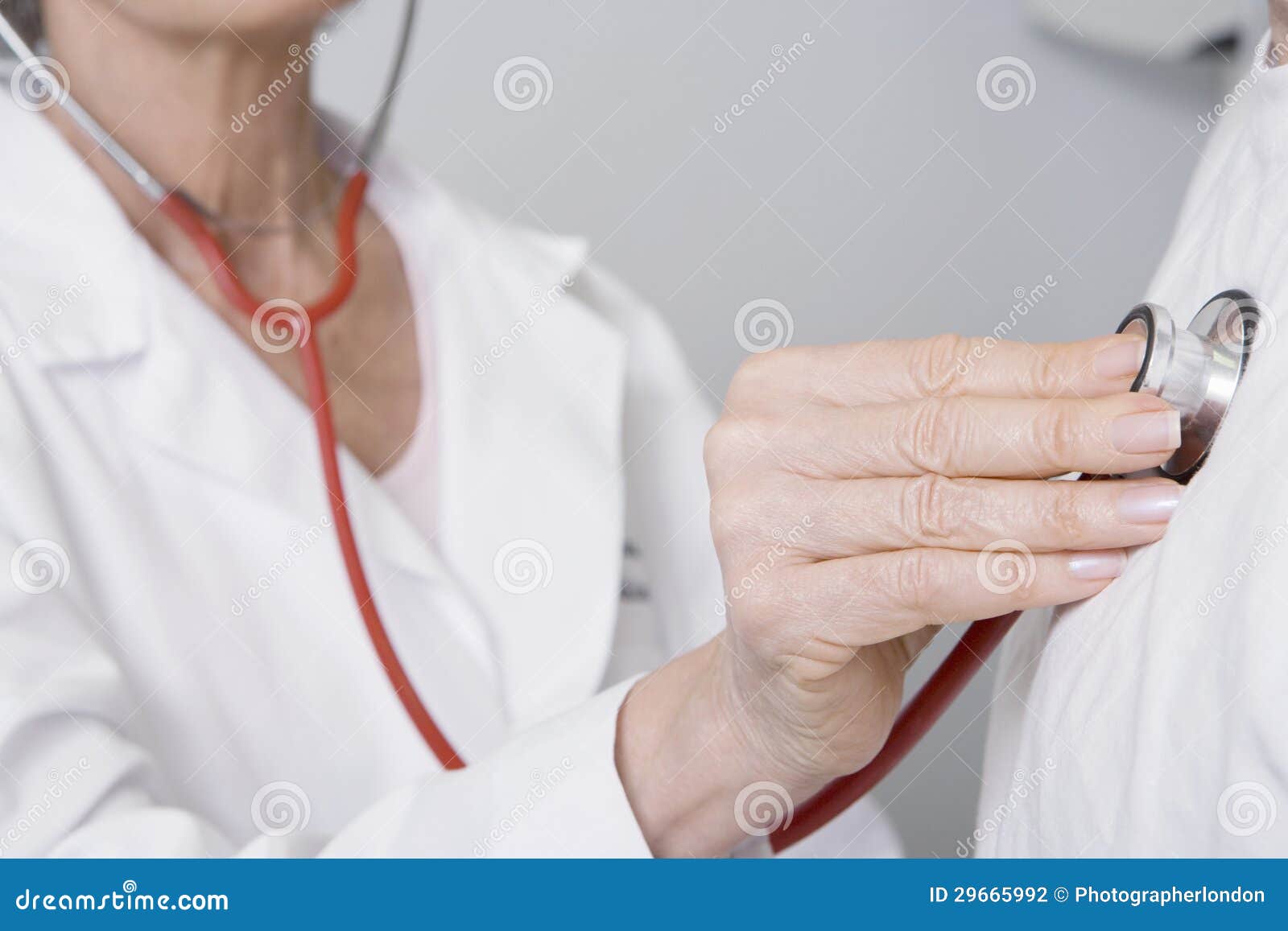 Doctor Checking Patients Heartbeat Using Stethoscope Stock Photo ...