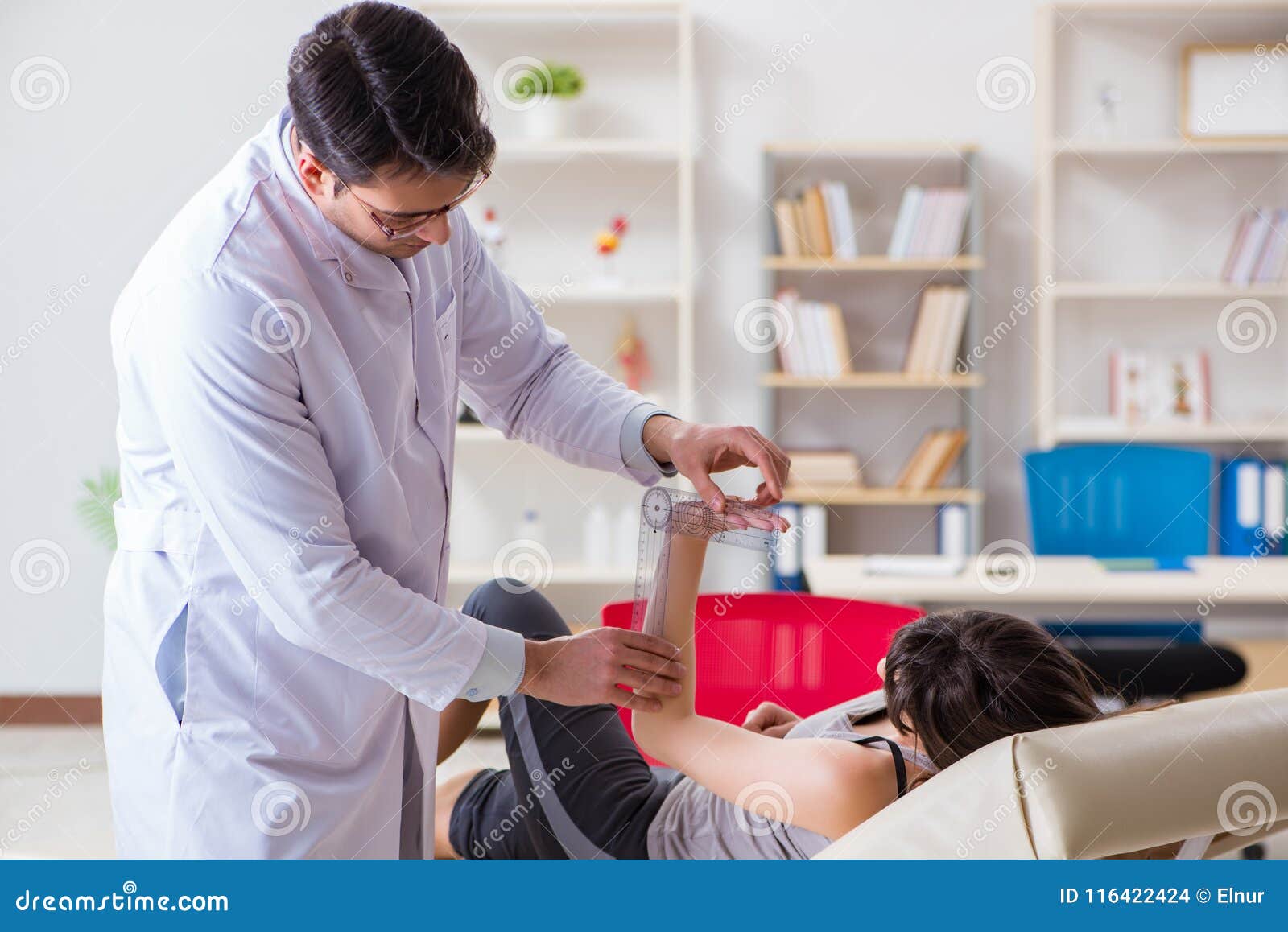 The Doctor Checking Patients Joint Flexibility Stock Photo - Image of ...