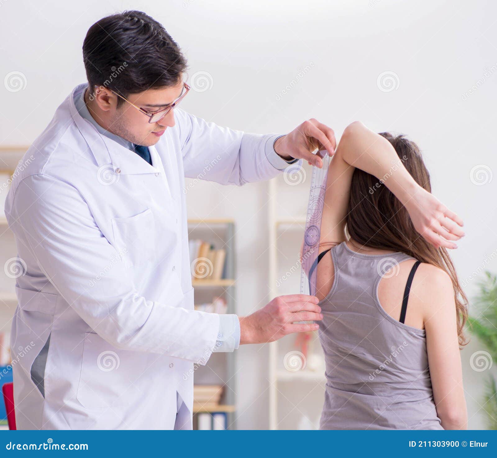 Doctor Checking Patients Joint Flexibility Stock Photo - Image of ...