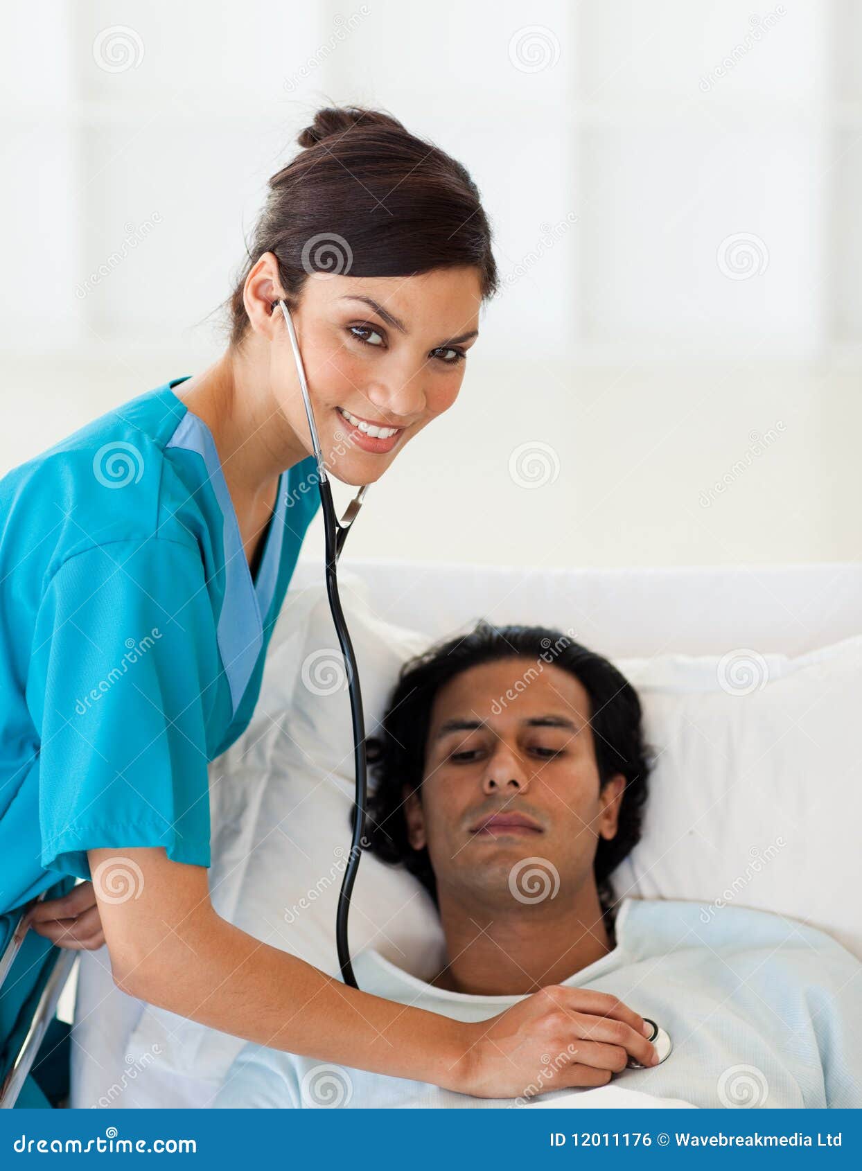 Doctor Checking the Pulse of a Patient Stock Photo - Image of lying ...