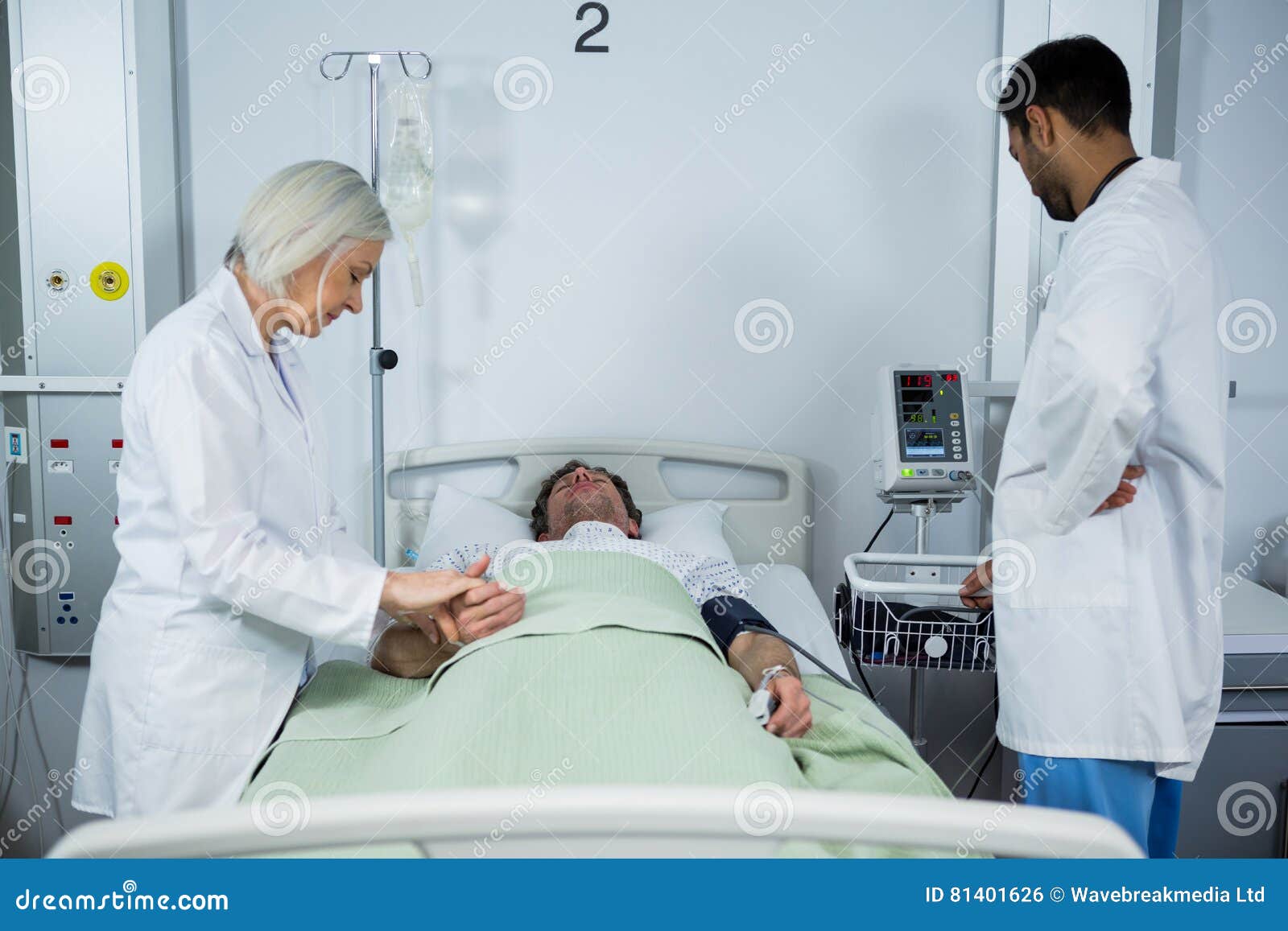 Doctor Checking Pulse of Patient Stock Photo - Image of eyes, clinical ...