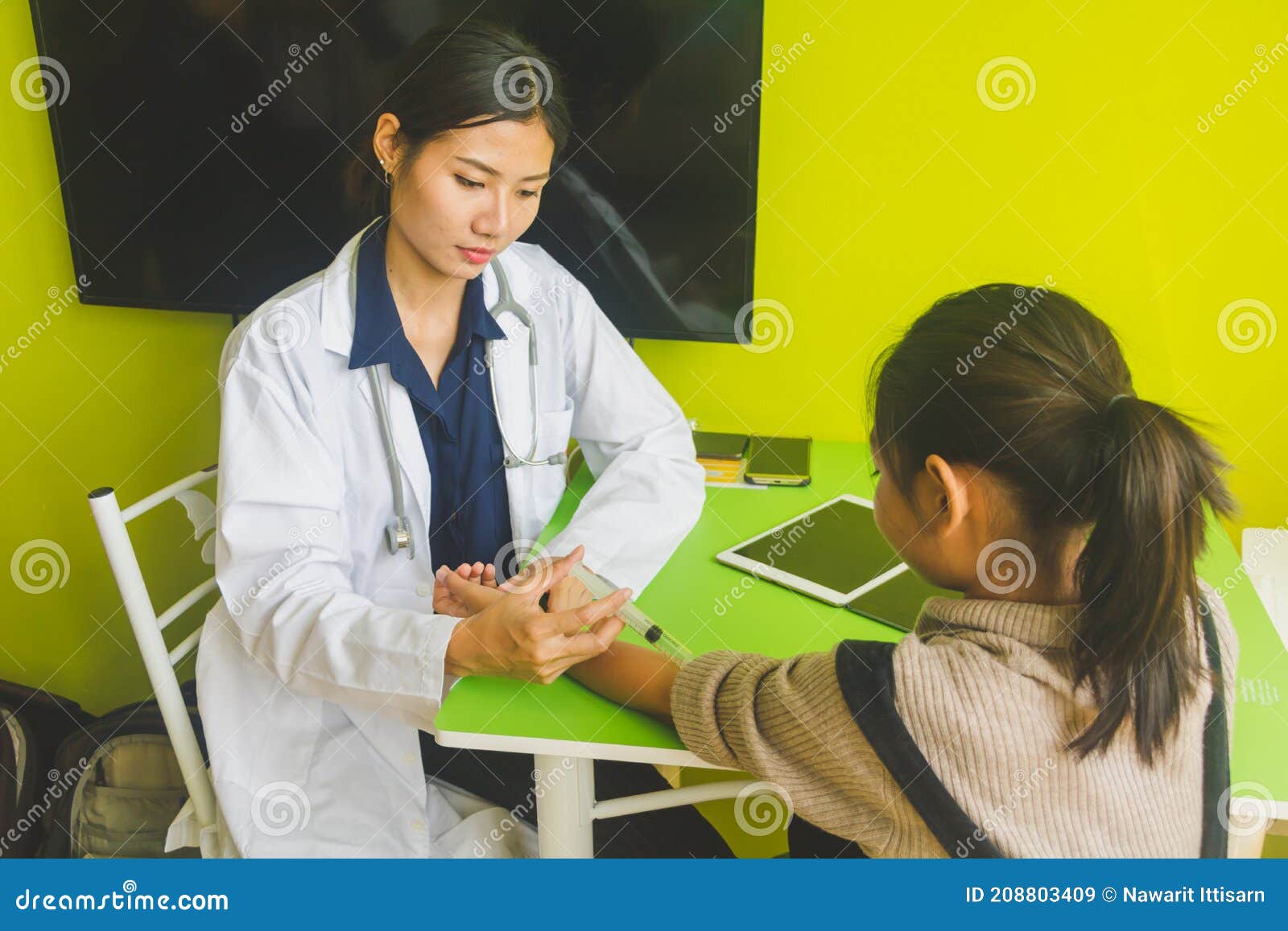 Doctor is Checking the Pulse of the Patient Kid Stock Image - Image of ...