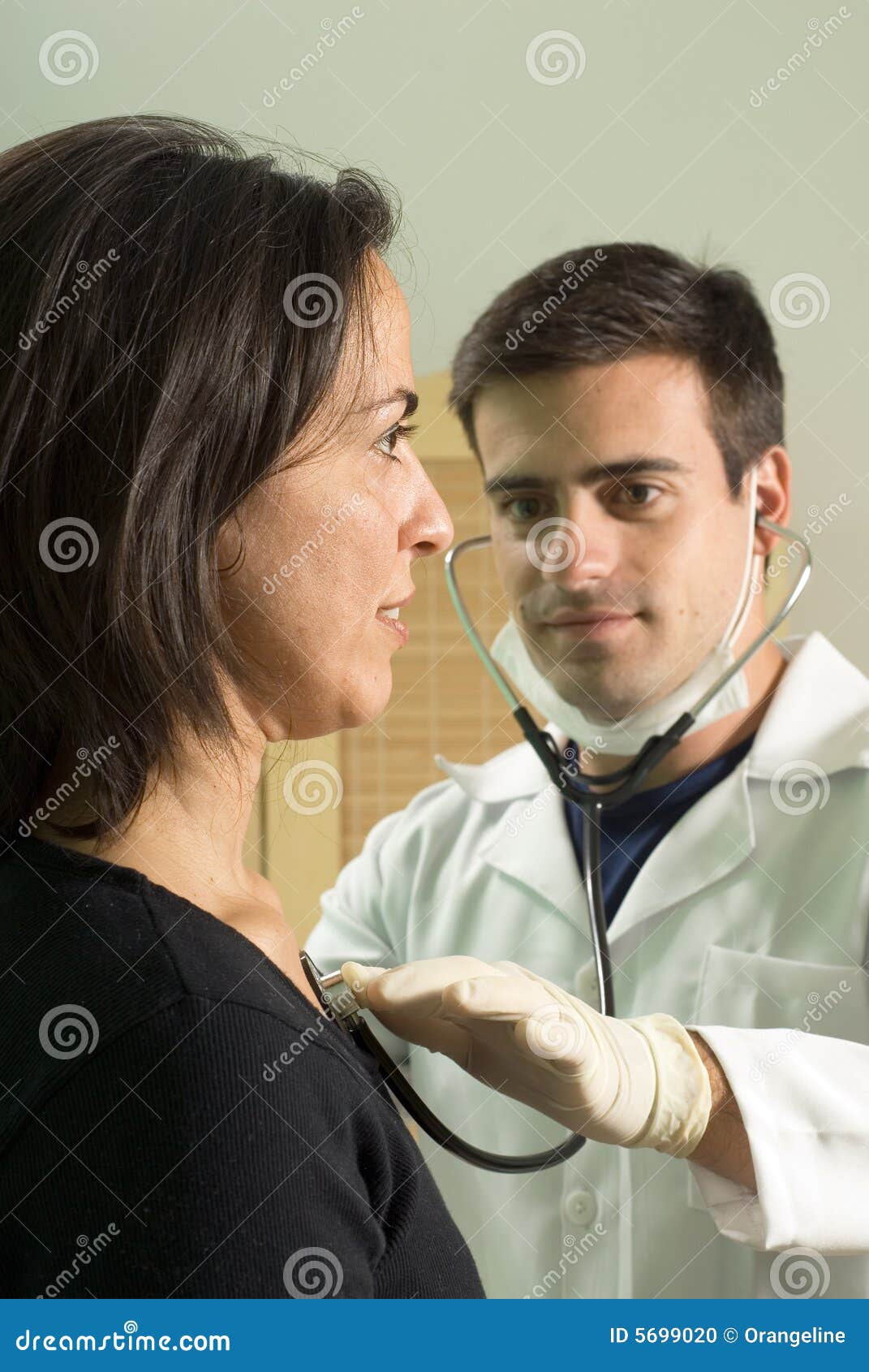 Doctor Checking Pulse - Vertical Stock Photo - Image of race, medical ...