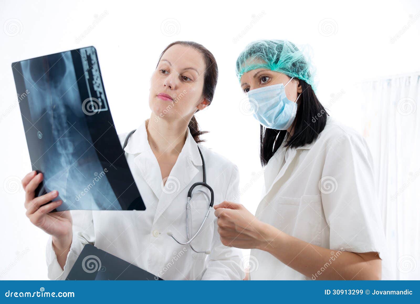 Doctor Checking X-ray Image Stock Image - Image of examining, emergency ...