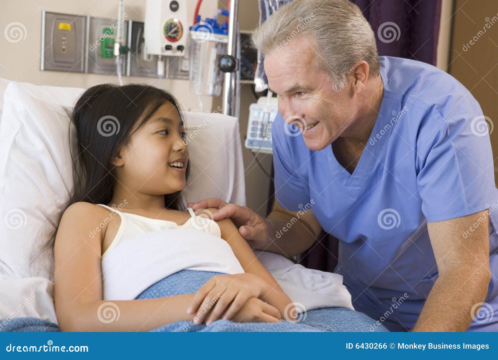 Doctor Checking Up on Patient Stock Photo - Image of color, cheerful ...