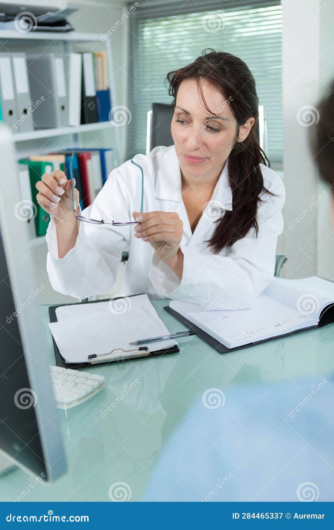 Doctor Checking Vision Goggles Stock Image - Image of exam, patient ...