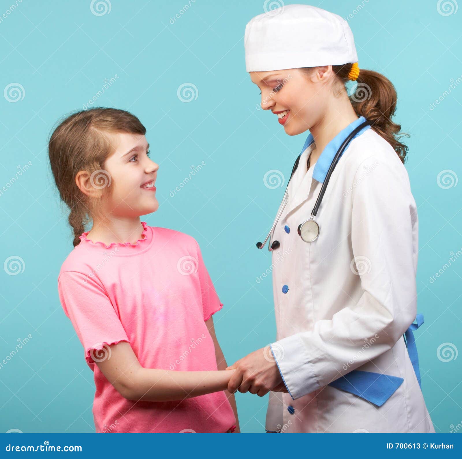 Doctor and child stock image. Image of female, pulse, health - 700613