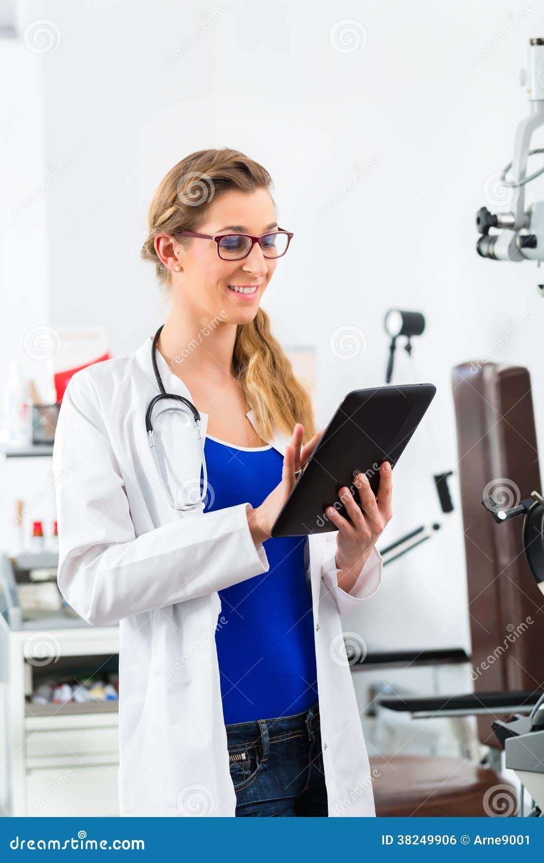 Doctor in Clinic Reading Digital File on Tablet Computer Stock Photo ...