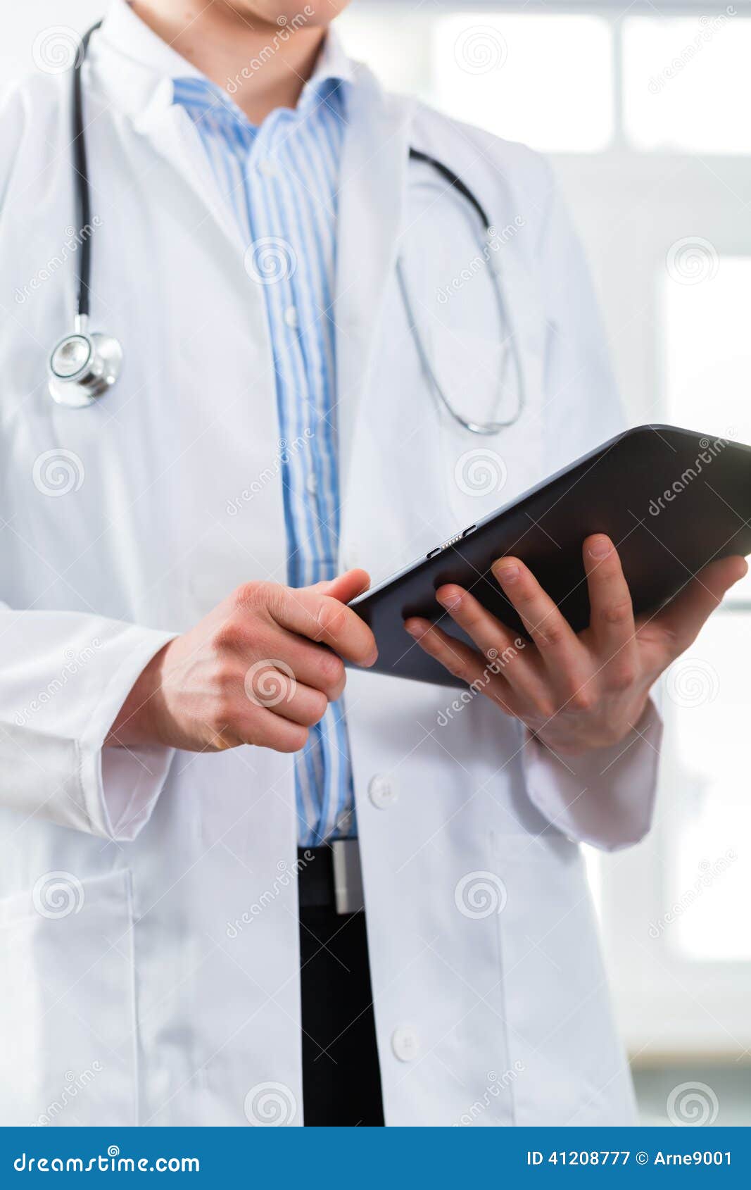 Doctor in Clinic Reading Digital File on Tablet Computer Stock Image ...
