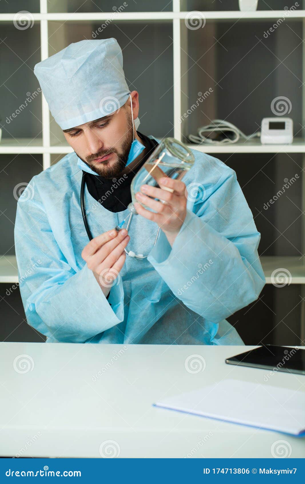 Doctor Comes into a Solution for Injection in a Syringe Stock Photo ...