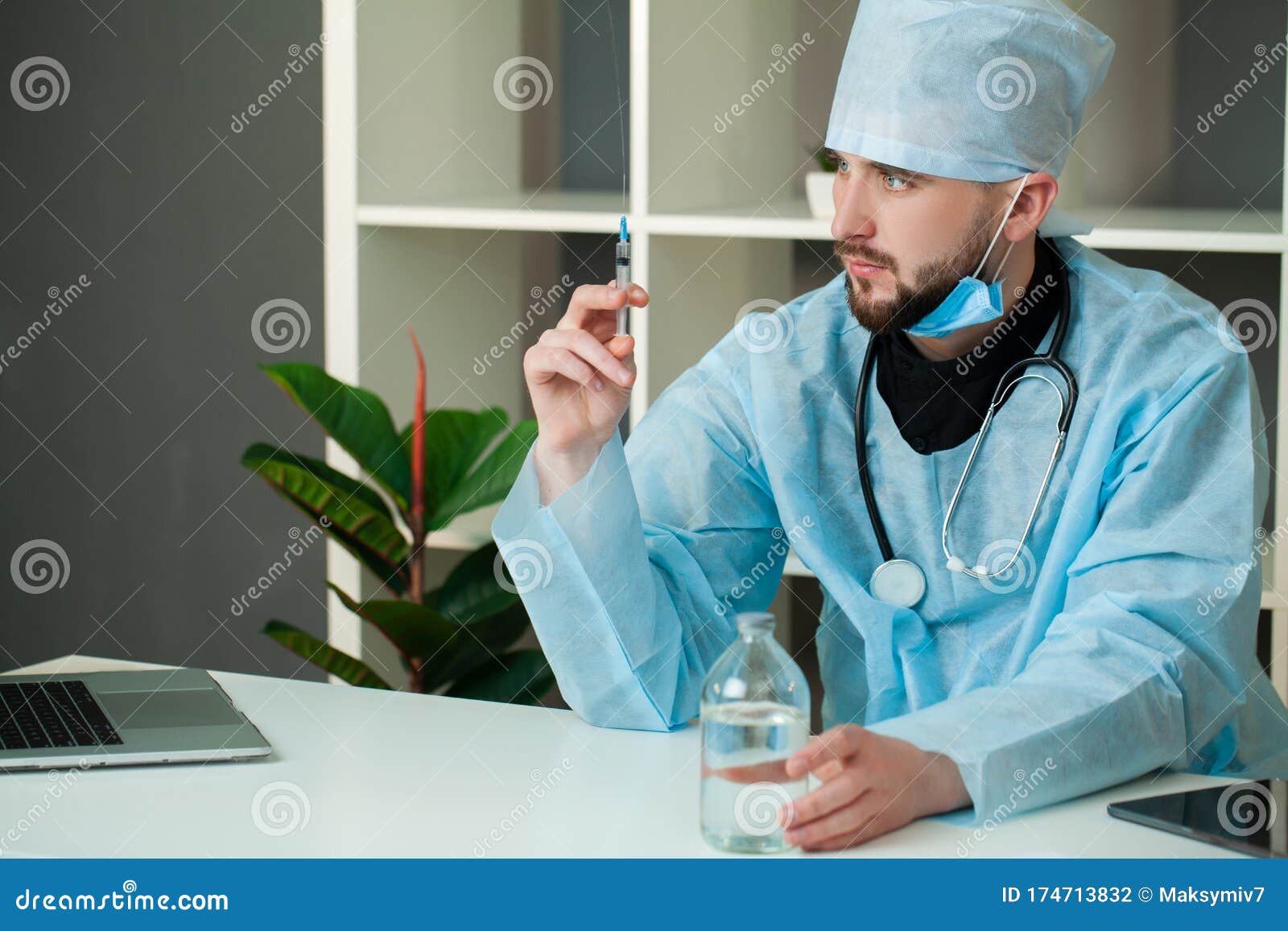 Doctor Comes into a Solution for Injection in a Syringe Stock Photo ...