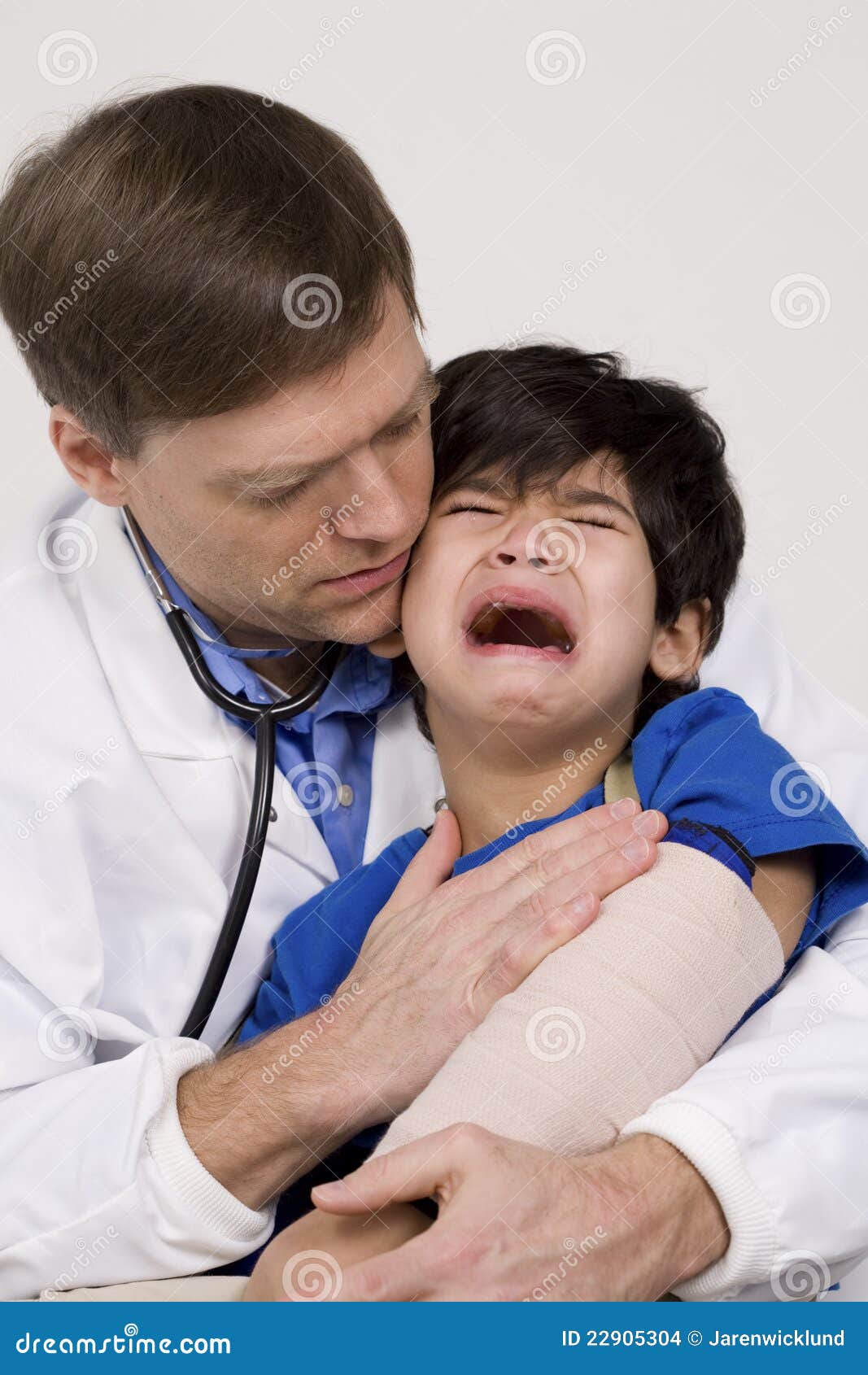 Doctor Comforting a Scared Little Boy Stock Photo - Image of exam, male ...
