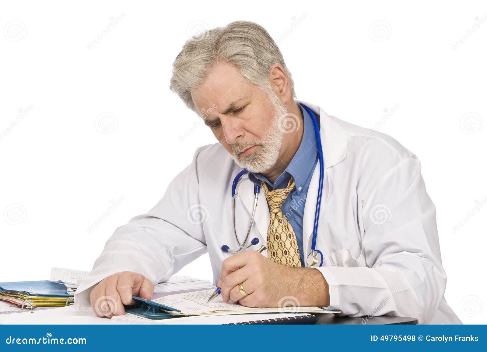 Doctor Completing Paperwork Stock Photo - Image of health, role: 49795498