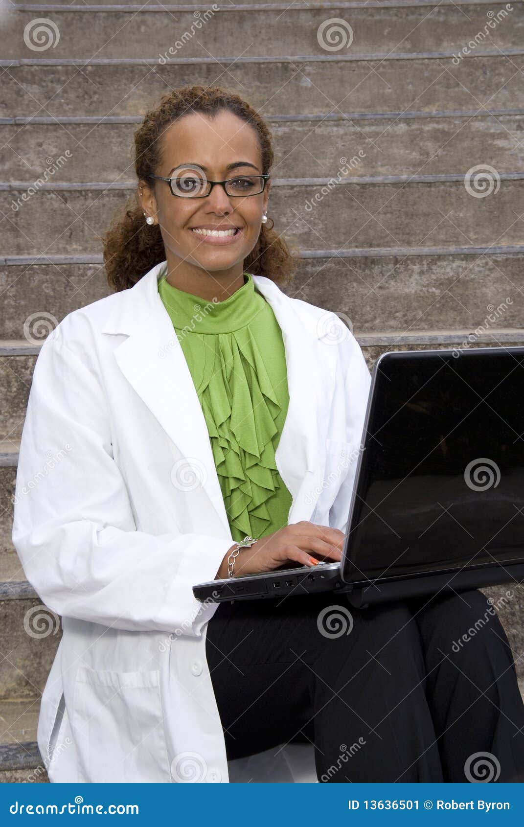 Doctor on a Computer stock image. Image of minority, health - 13636501